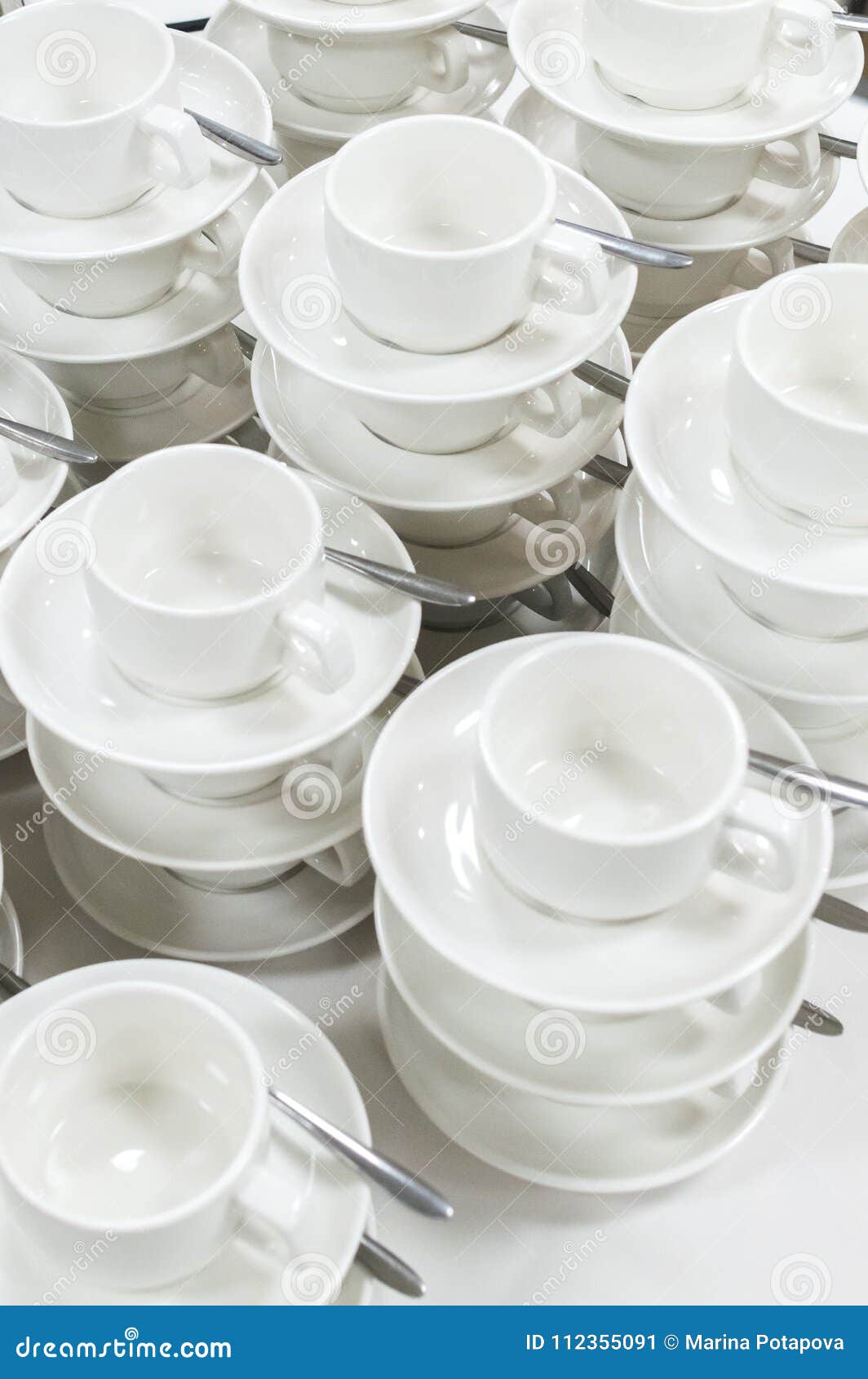 Sets of Clean White Cups and Saucers in Rows and One on Another Stock ...