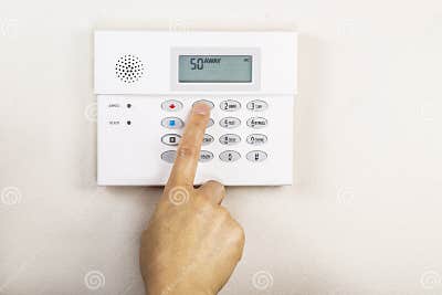 Setting Home Alarm System stock photo. Image of code - 26527802