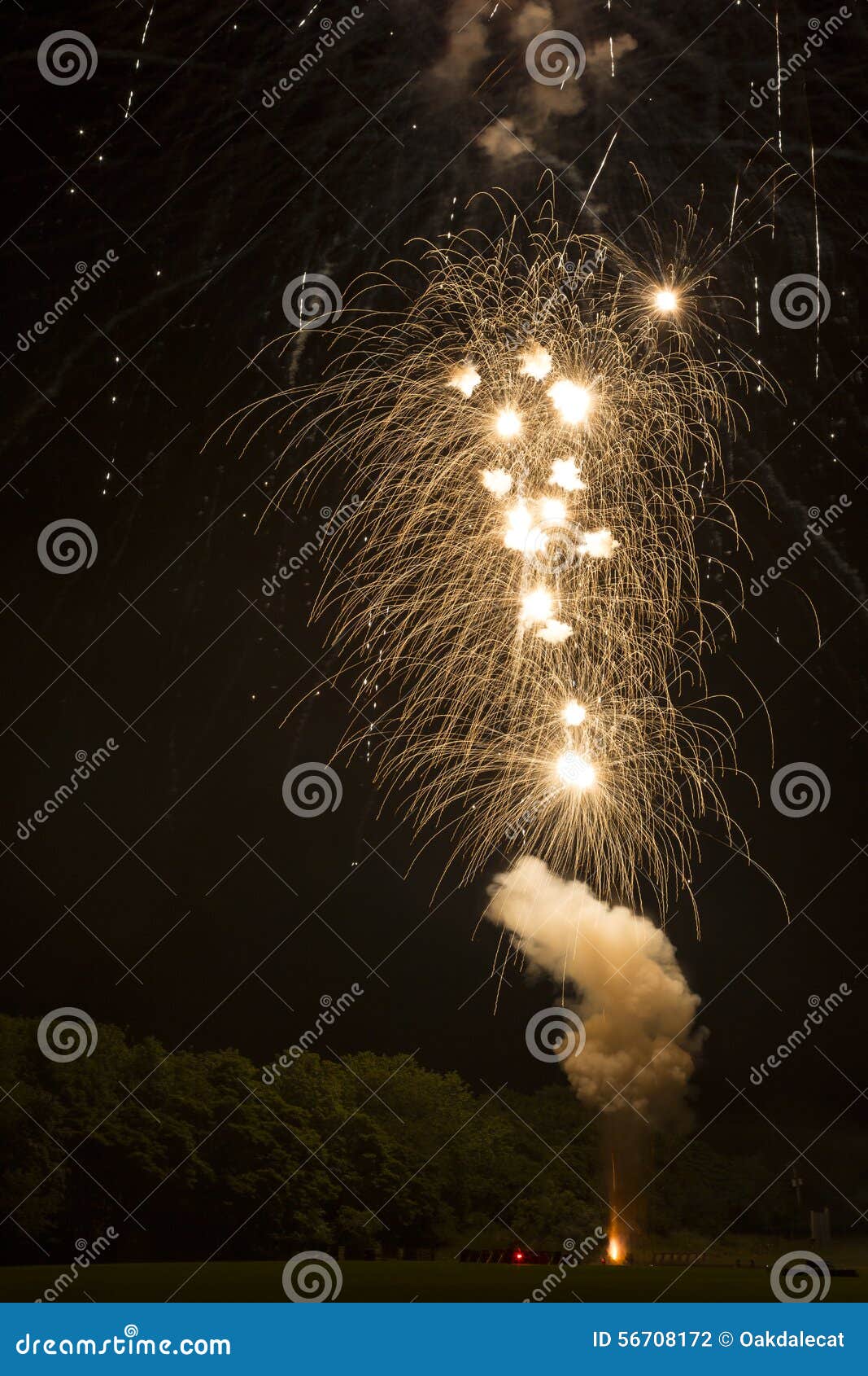 Setting Off Fireworks at Night: Up in a Puff of Smoke Stock Photo ...