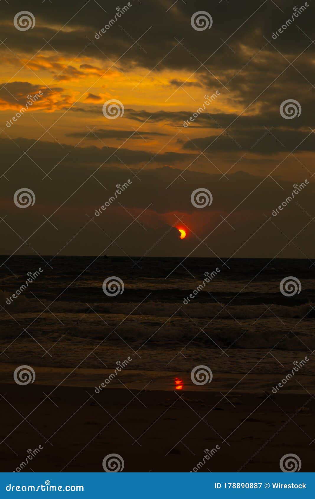 Setting sun at the beach stock image. Image of scenery - 178890887