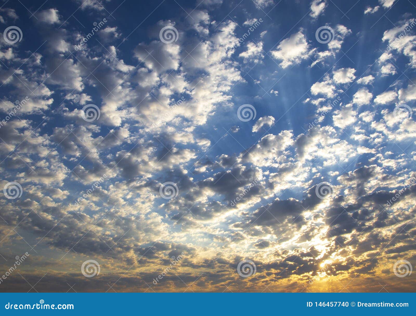 The Setting Sun Behind the Passing Clouds Stock Photo - Image of ... The Setting Sun Behind the Passing Clouds Stock Photo - Image of ...