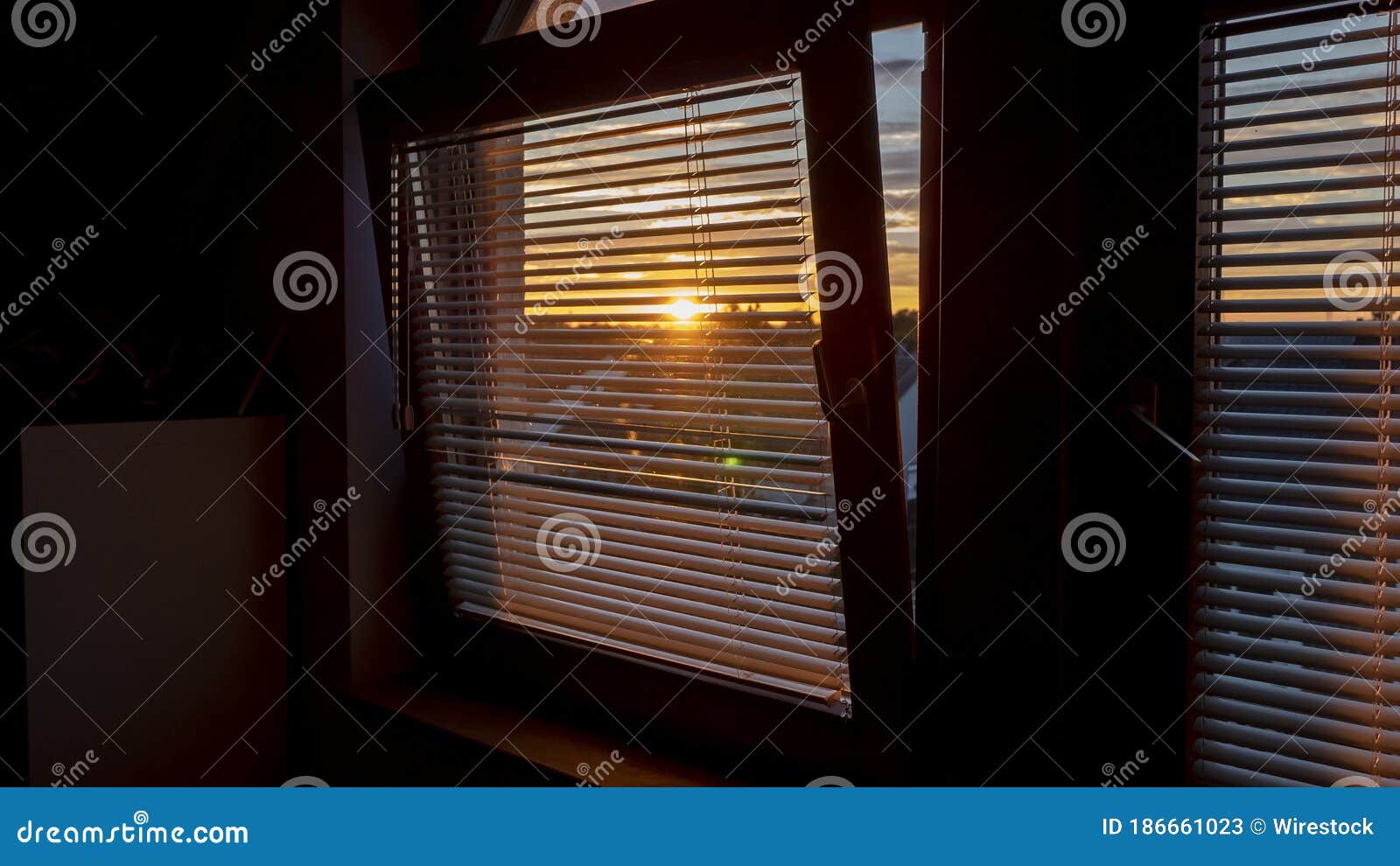 Setting Sun Behind the Window with Blinds Stock Image - Image of blue ...