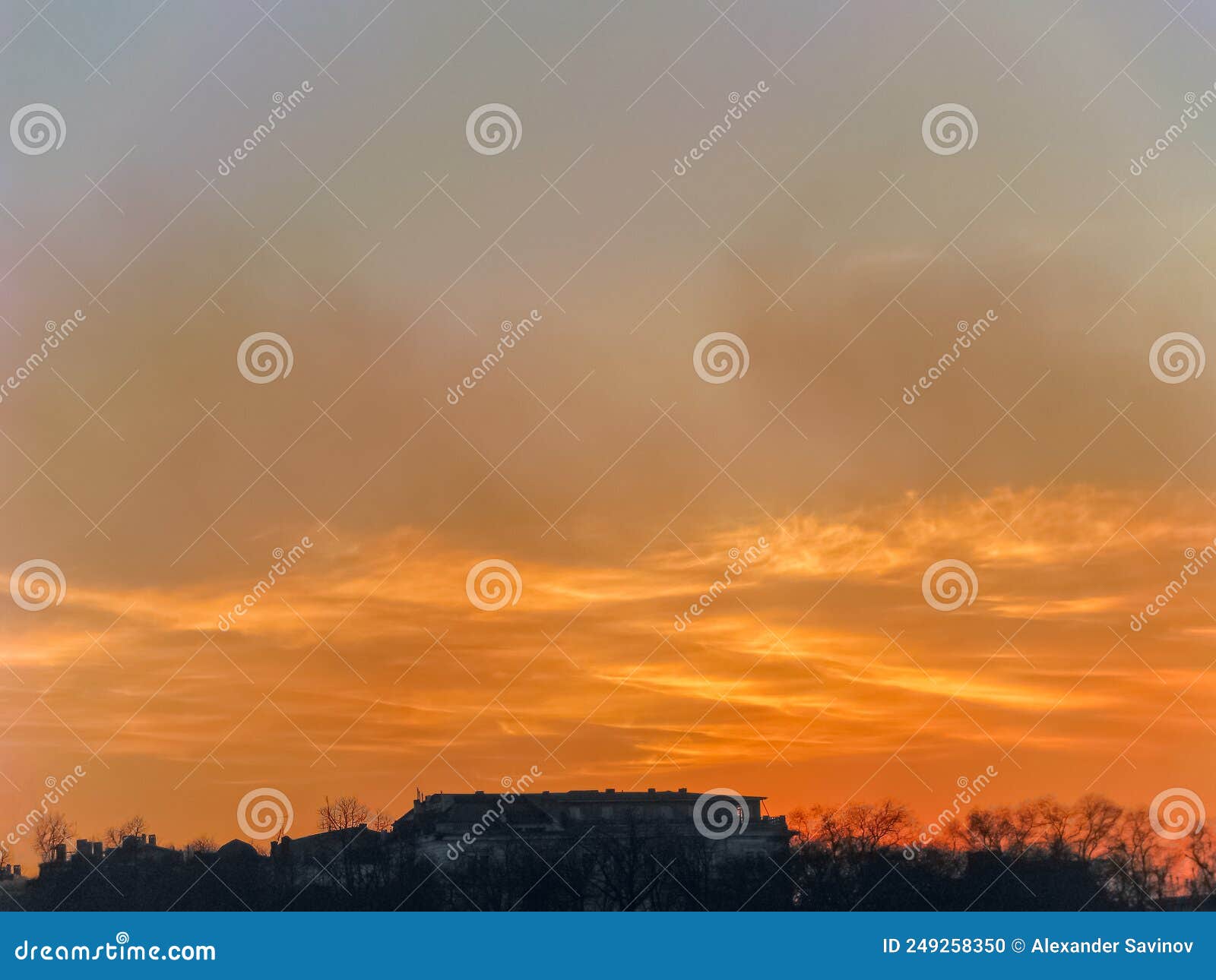 The Setting Sun and Clouds Formed a Dramatic Colorful Picture in the ...