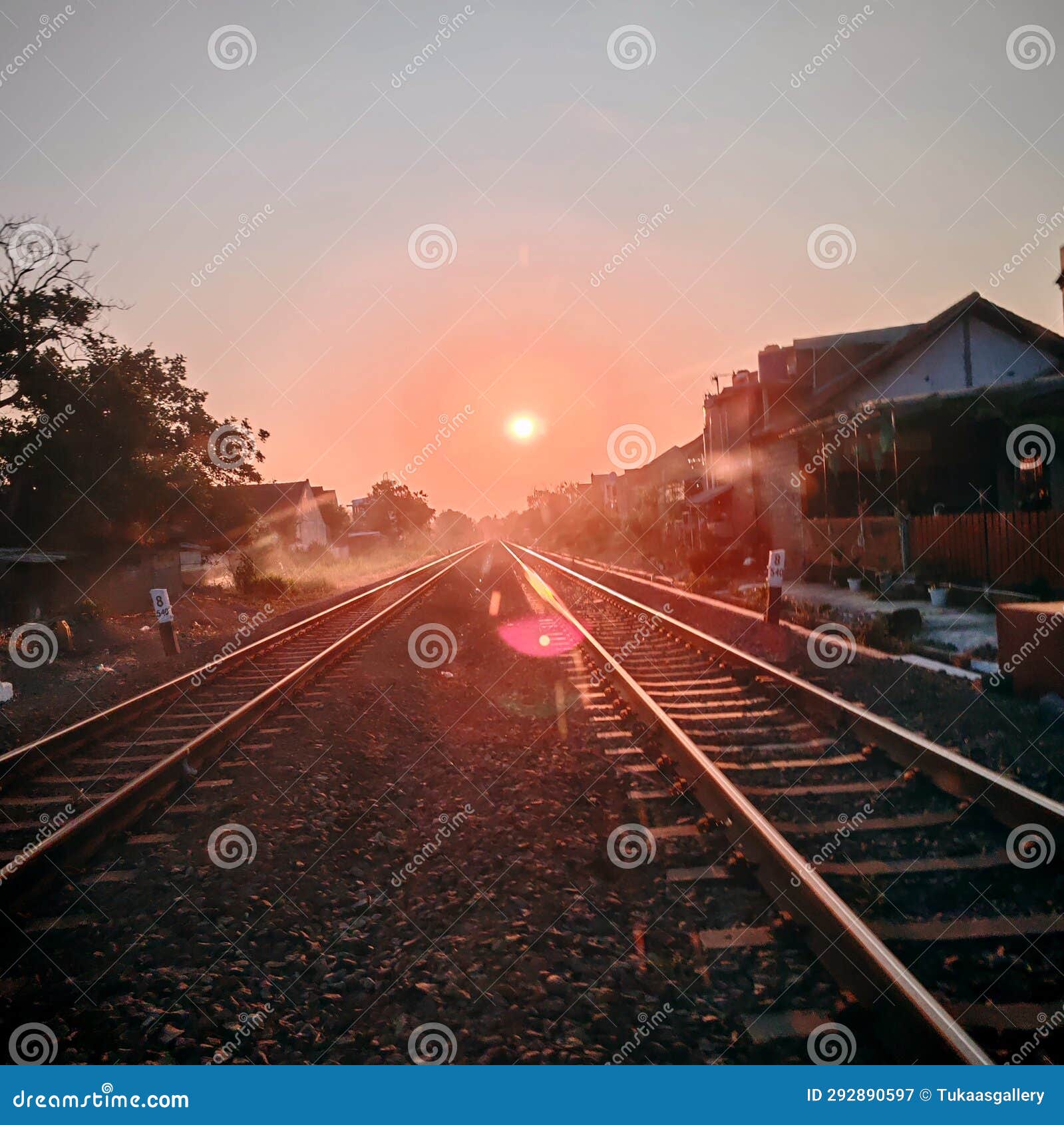The Setting Sun at the End of the Train Tracks Stock Image - Image of ...