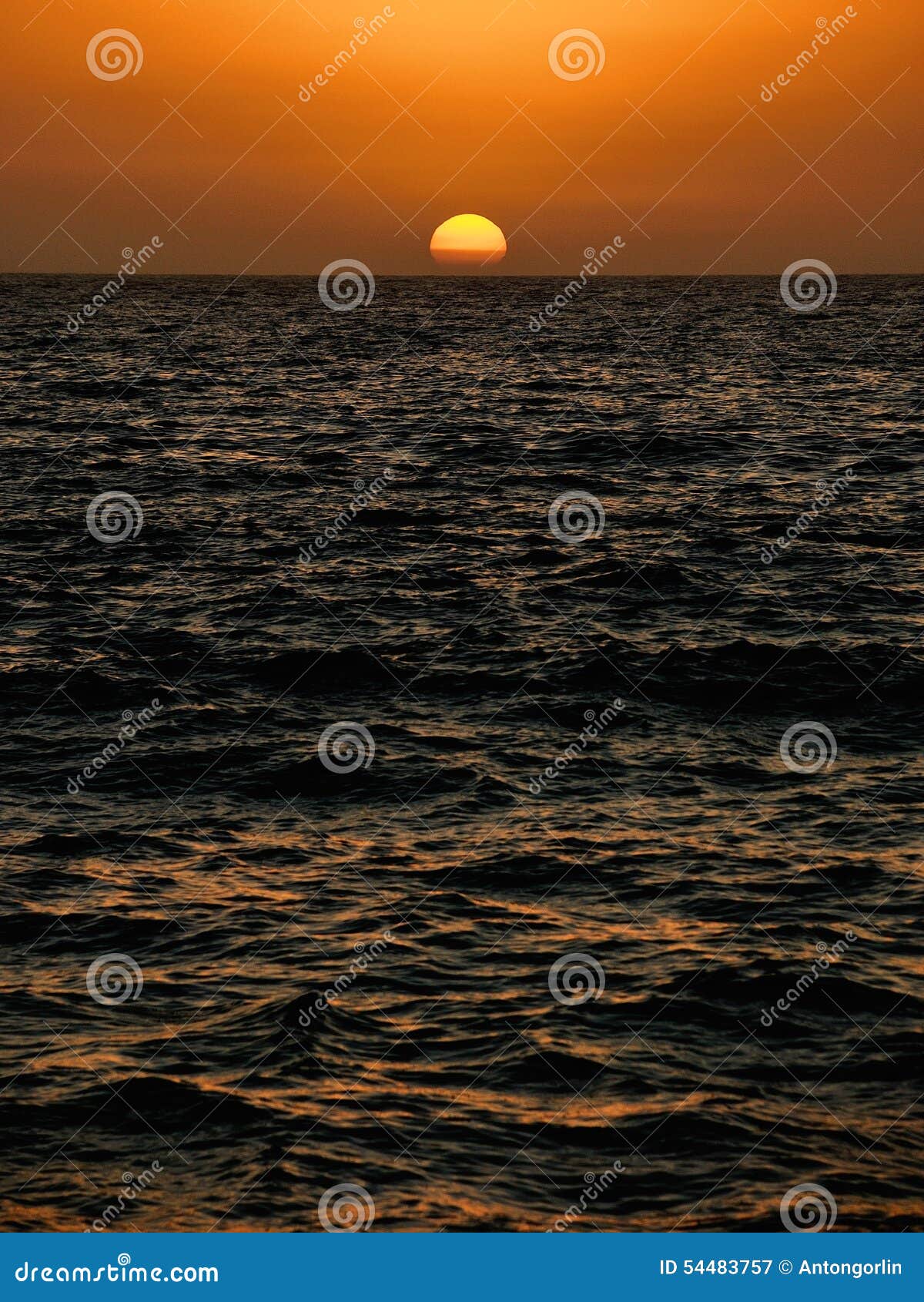 Setting sun over the ocean stock image. Image of nature - 54483757