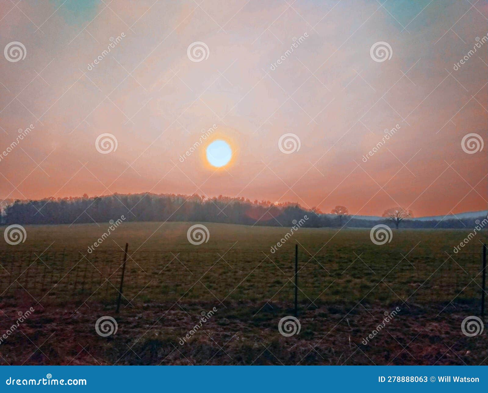 Setting Sun Over the Open Pasture Stock Image - Image of evening, cloud ...