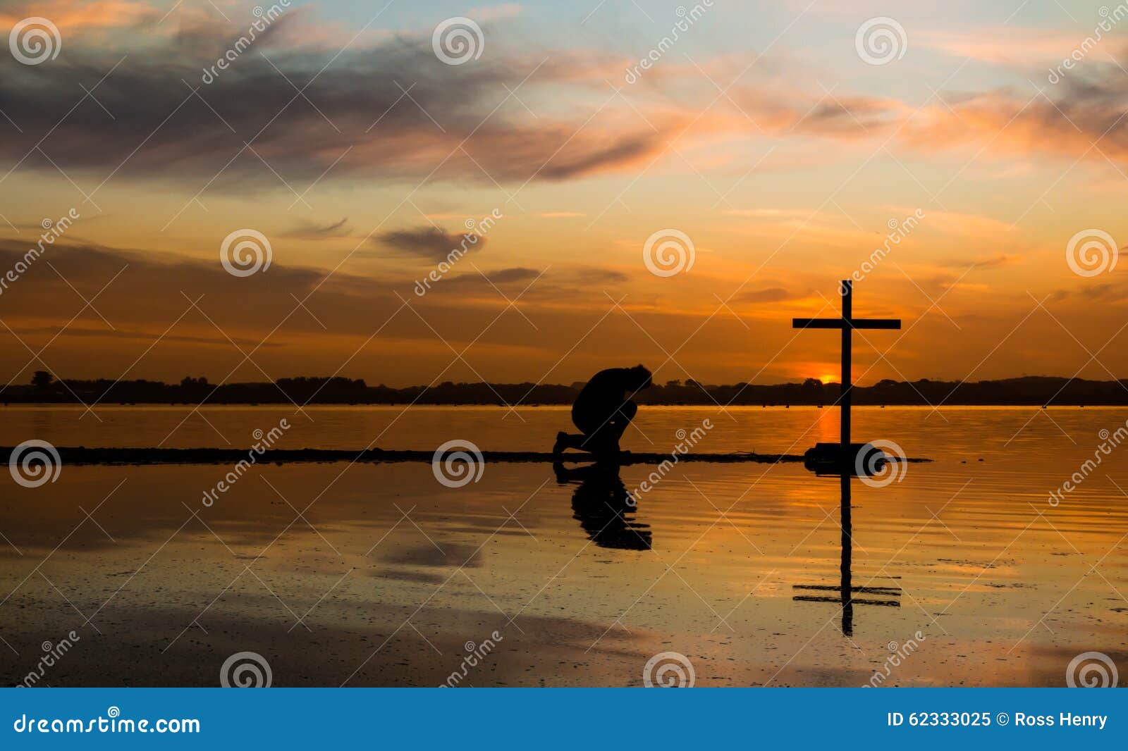 Setting Sun Praying stock image. Image of religion, salvation - 62333025