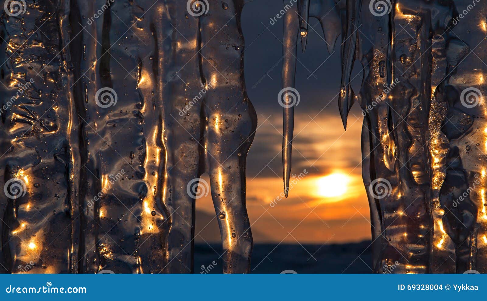 Setting Sun is Reflected in Icicles. Stock Photo - Image of clouds ...