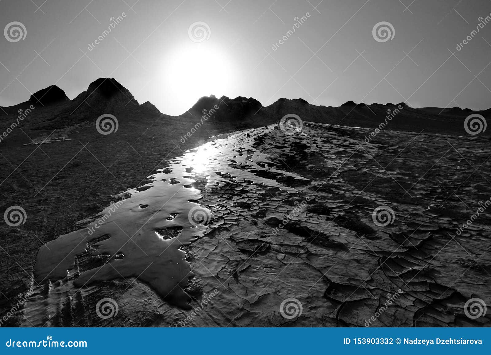 The Setting Sun is Reflected in a Stream from the Mud Volcano Stock ...