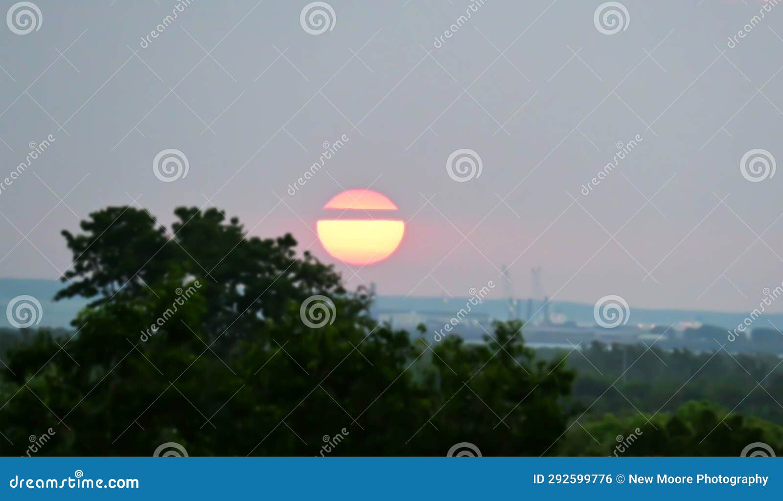 A Split Sun Sets Over the Harbor Stock Photo - Image of natural ...