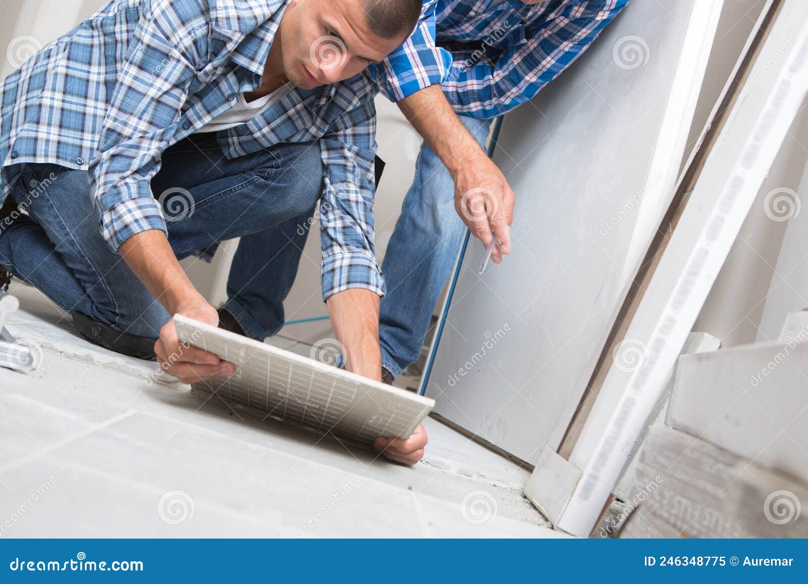 He setting tile stock image. Image of laborer, build - 246348775