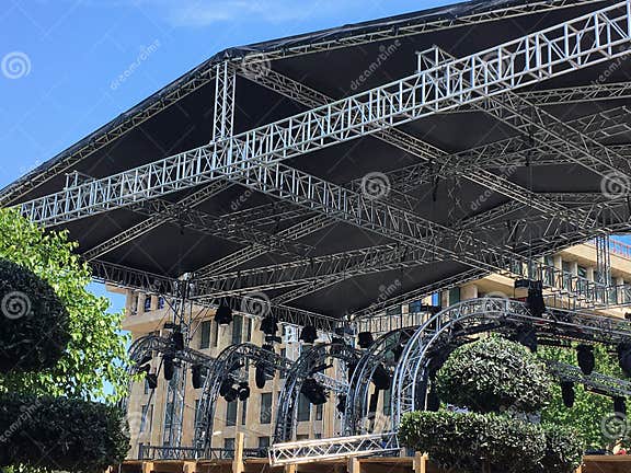 Setting Up a Large Steel Outdoor Stage, Outdoor Installation Stock ... Setting Up a Large Steel Outdoor Stage, Outdoor Installation Stock ...