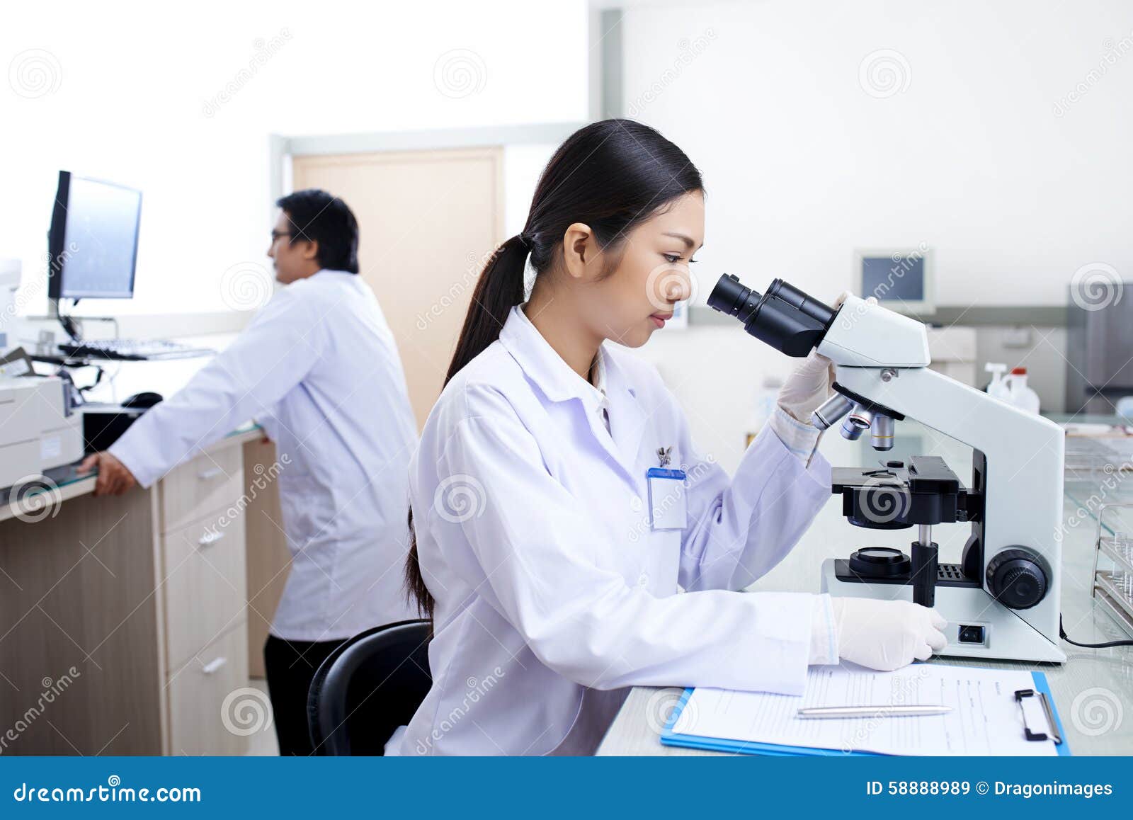 Setting up microscope stock image. Image of analyzing - 58888989