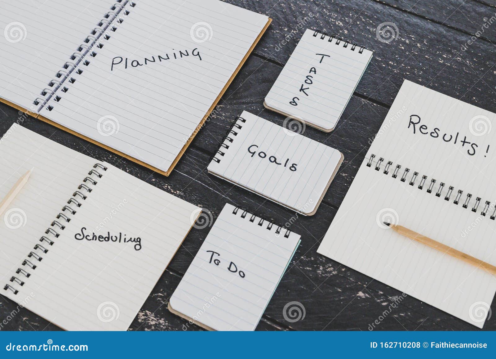 Setting Up for Success, Business Desk with Notebooks with Elements from ...