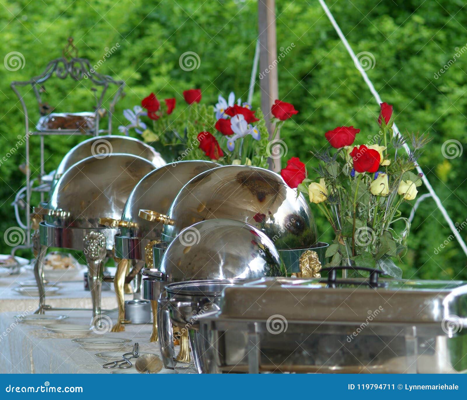 Buffet with Red Roses and Silver Stock Image - Image of reception ...