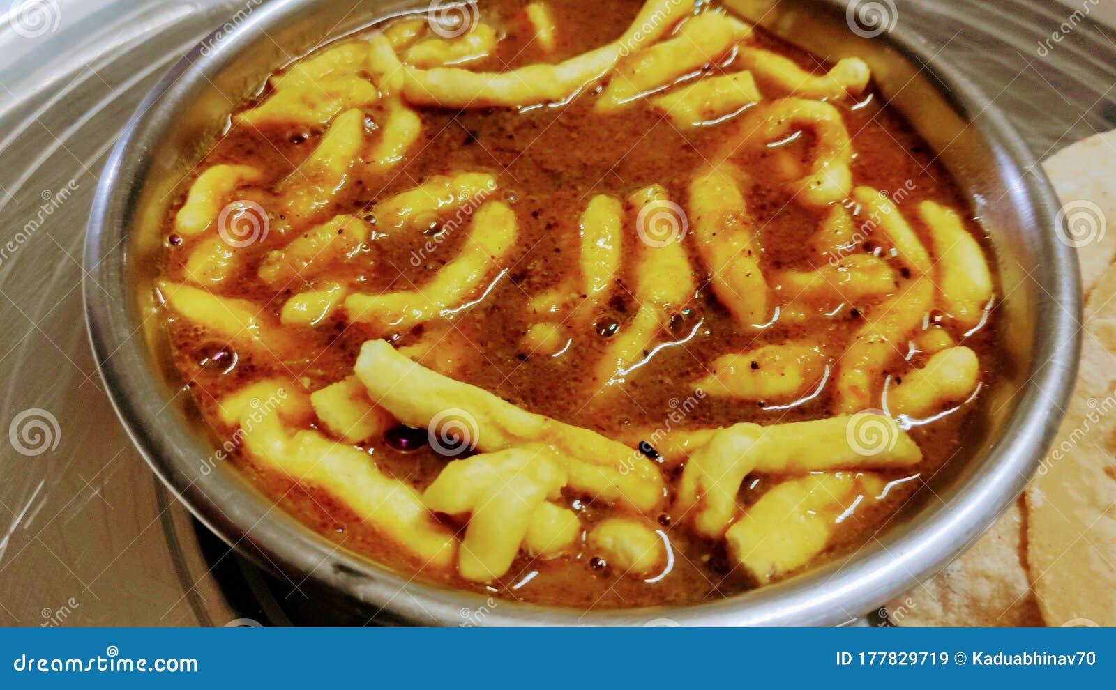 Sev Bhaji curry dish stock image. Image of gramfloursticks - 177829719