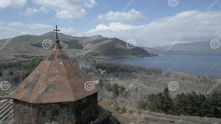 Sevan Monastery. Buildings, Lake Sevan, Mountains, Rocks, Grass, Sky, People Stock Image - Image ...
