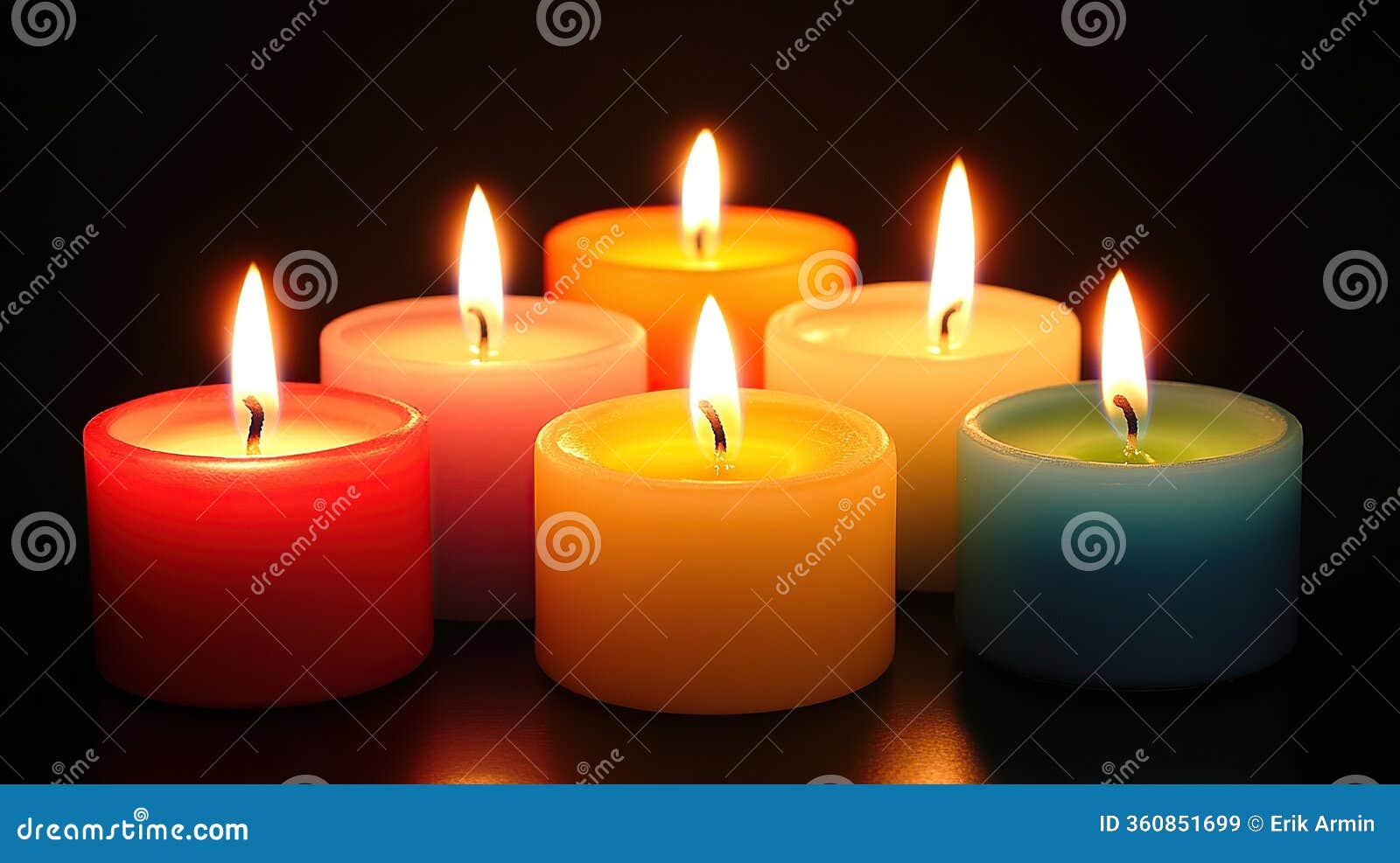 Seven Colorful Candles Burning Brightly in the Dark Stock Image - Image ...