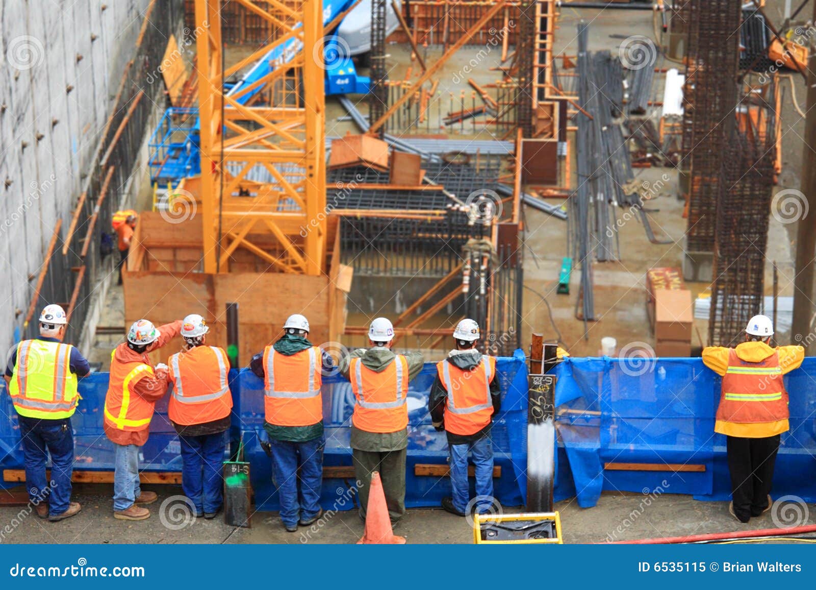 Construction Workers Install Formwork And Iron Rebars Or Reinforcing ...