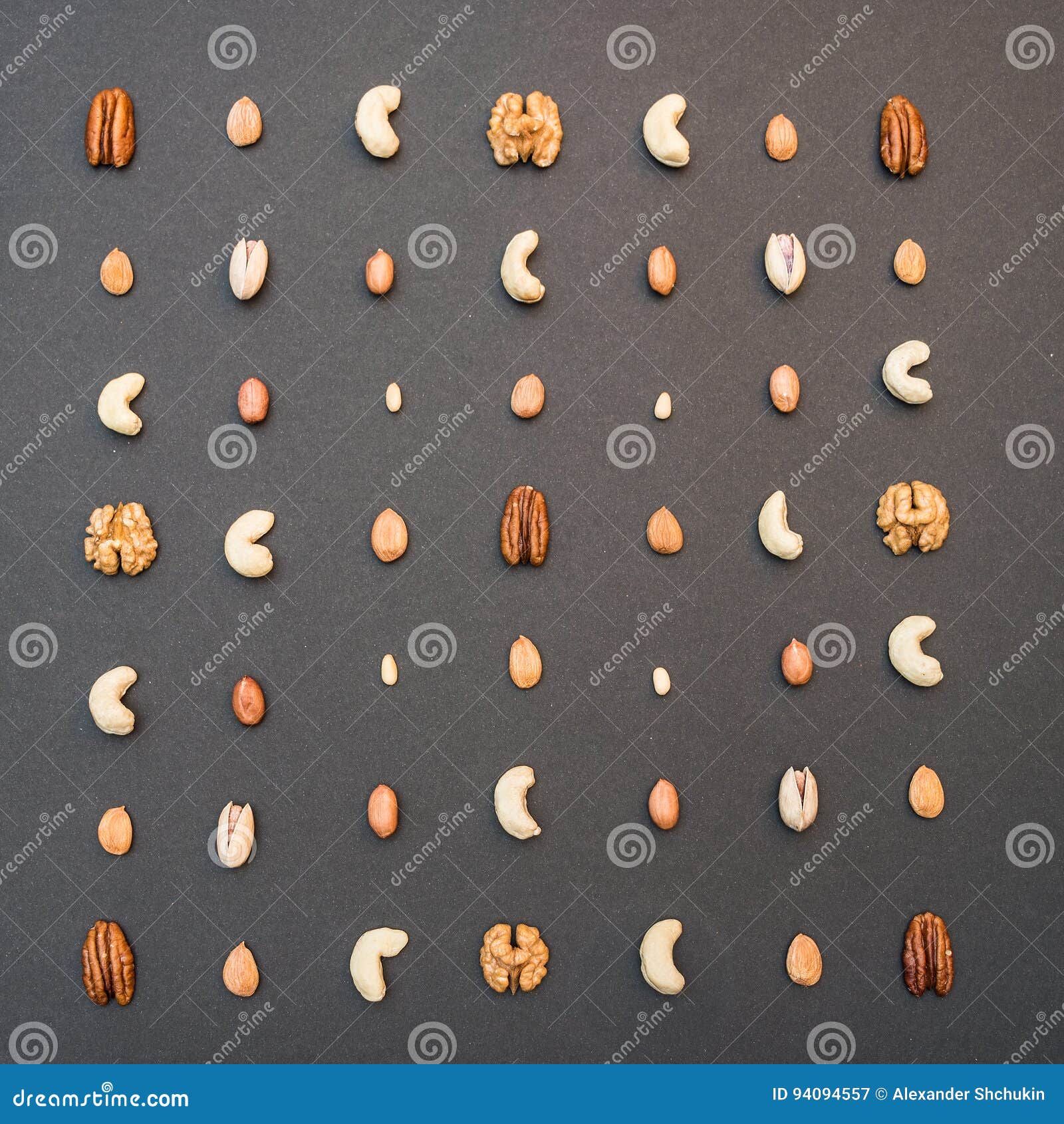 Seven Different Nuts on a Black Background Pattern Stock Image - Image ...