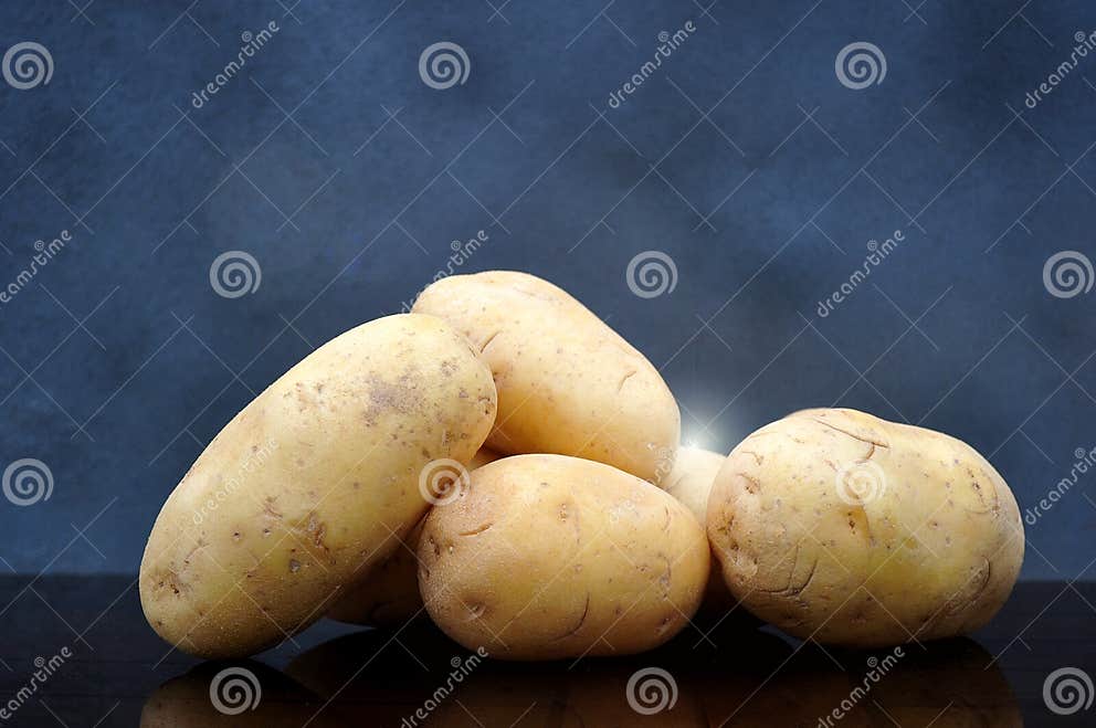 Seven Potatoes in dark stock photo. Image of healthy - 91880992