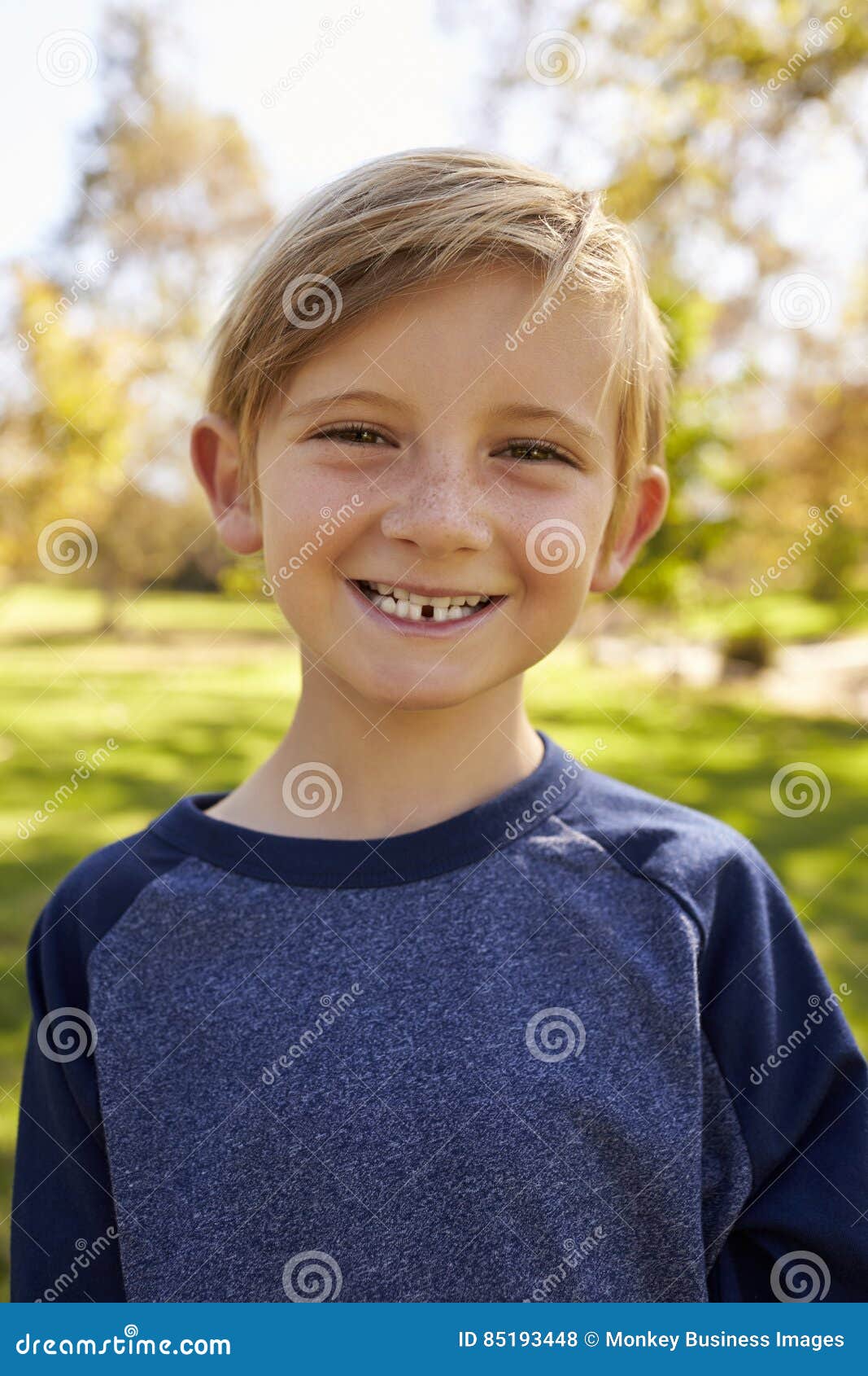 Seven Year Old Caucasian Boy in a Park, Vertical Portrait Stock Photo ...