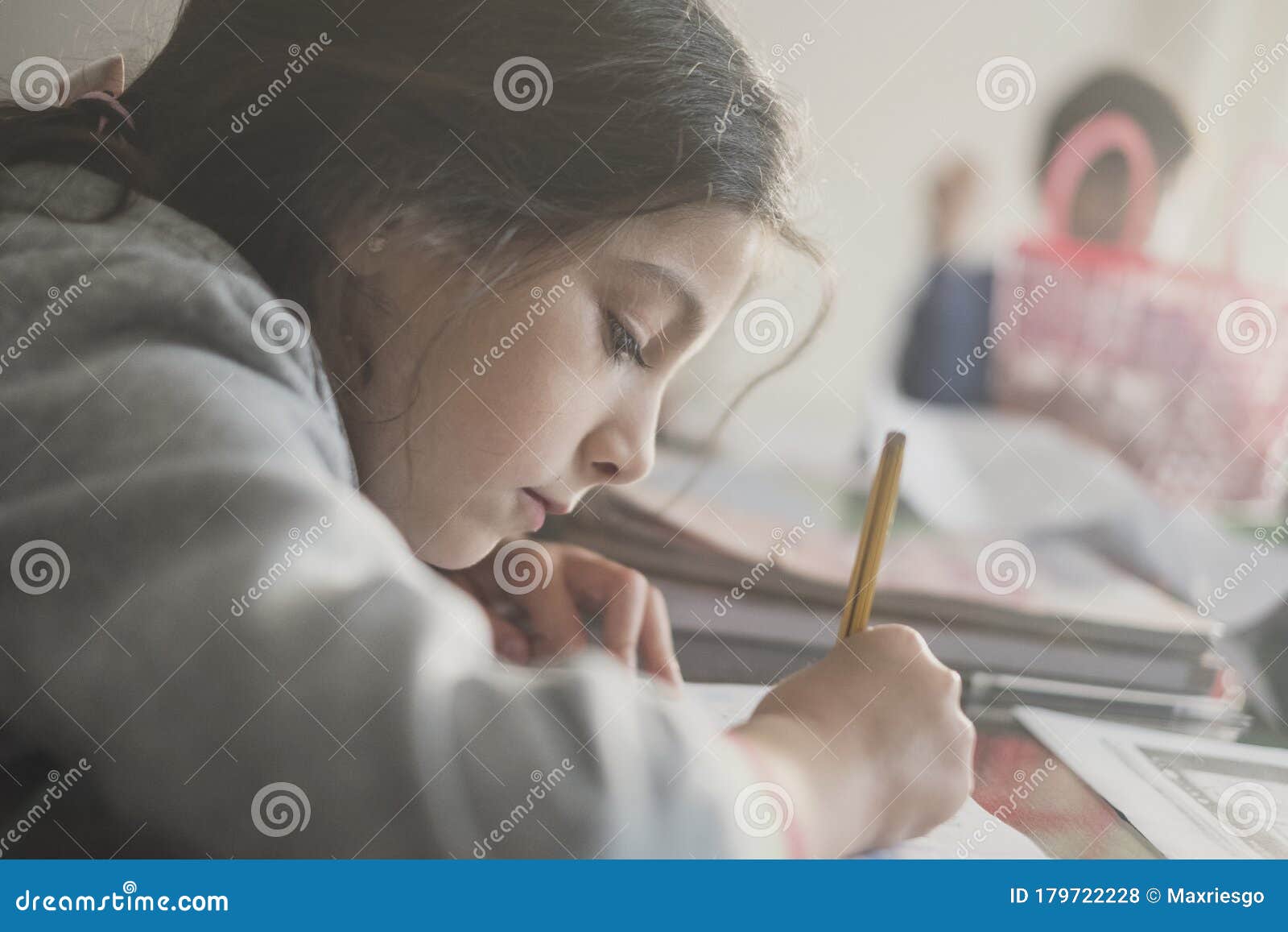 Seven Years Old Girl Doing Homework at Home Stock Photo - Image of ...