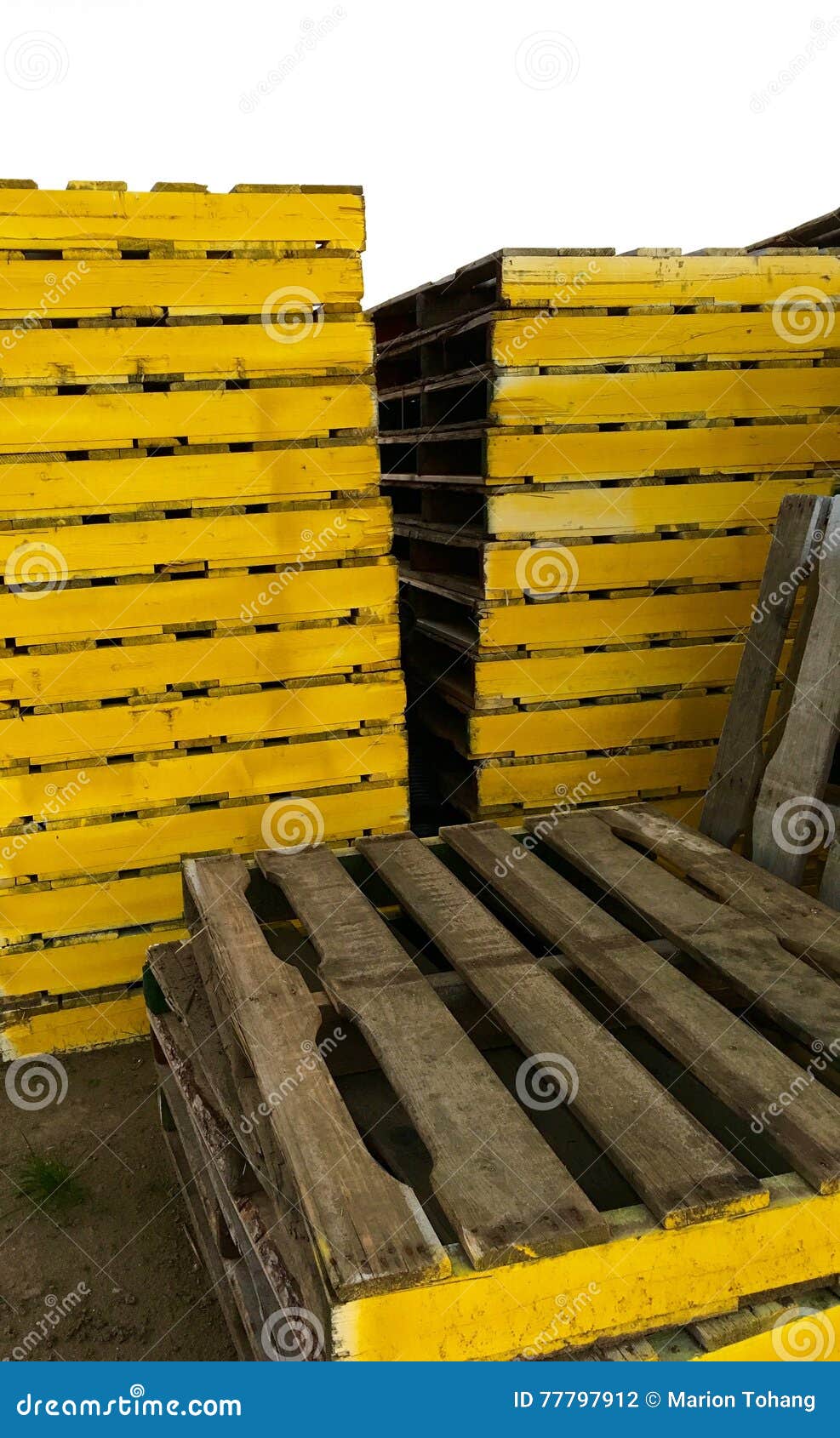 Several Big Stacks of Yellow Wooden Pallets Stock Photo - Image of ...