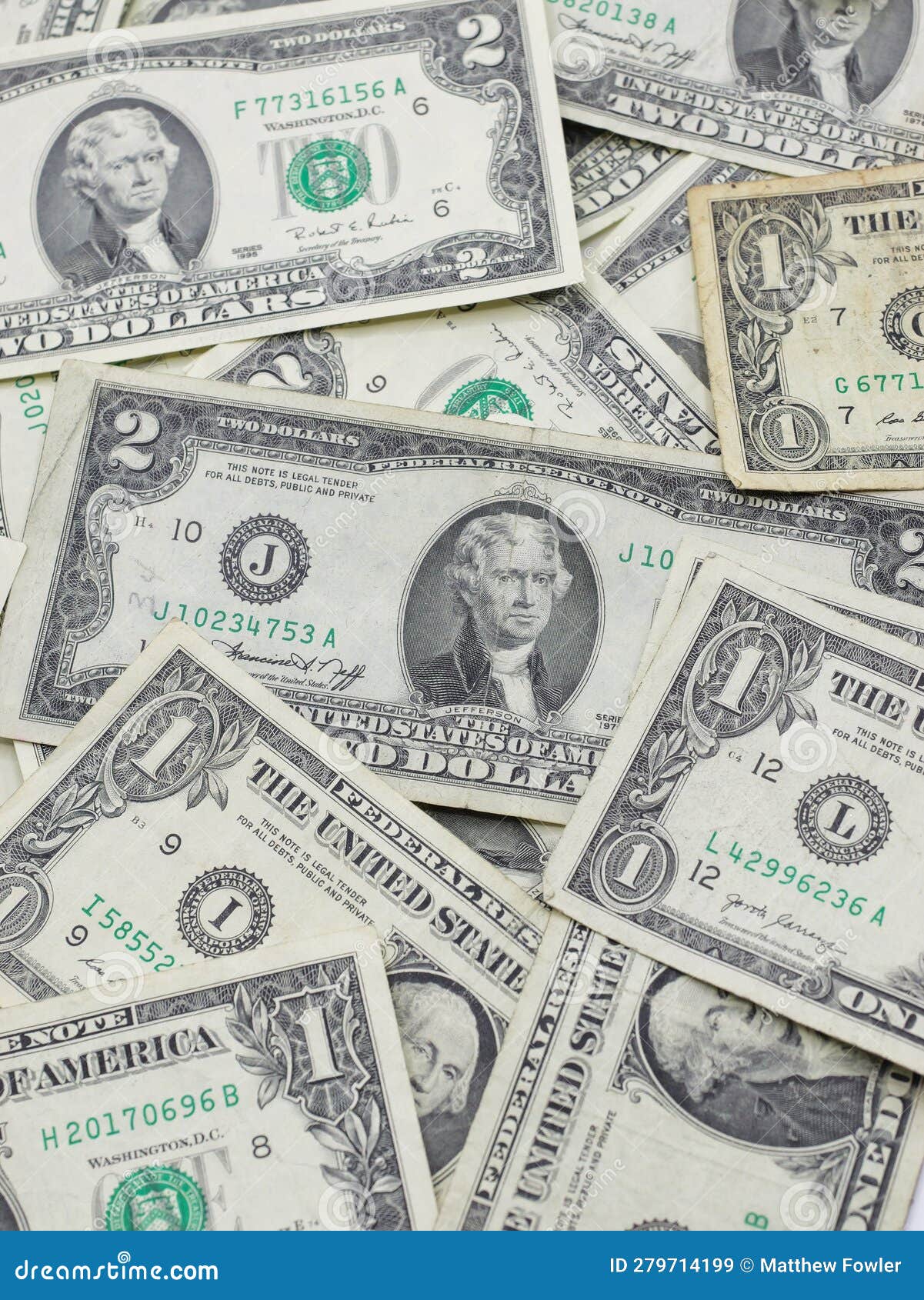 Several $1 and $2 Bills Close Up on Surface Stock Image - Image of ...