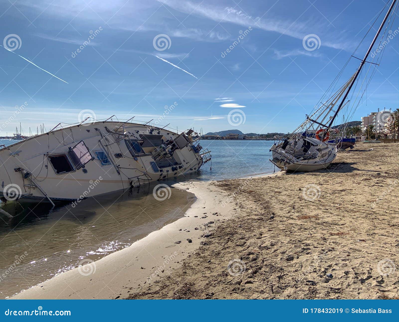 Several Boats Stranded on the Beach after a Storm. on a Sunny Day with ...