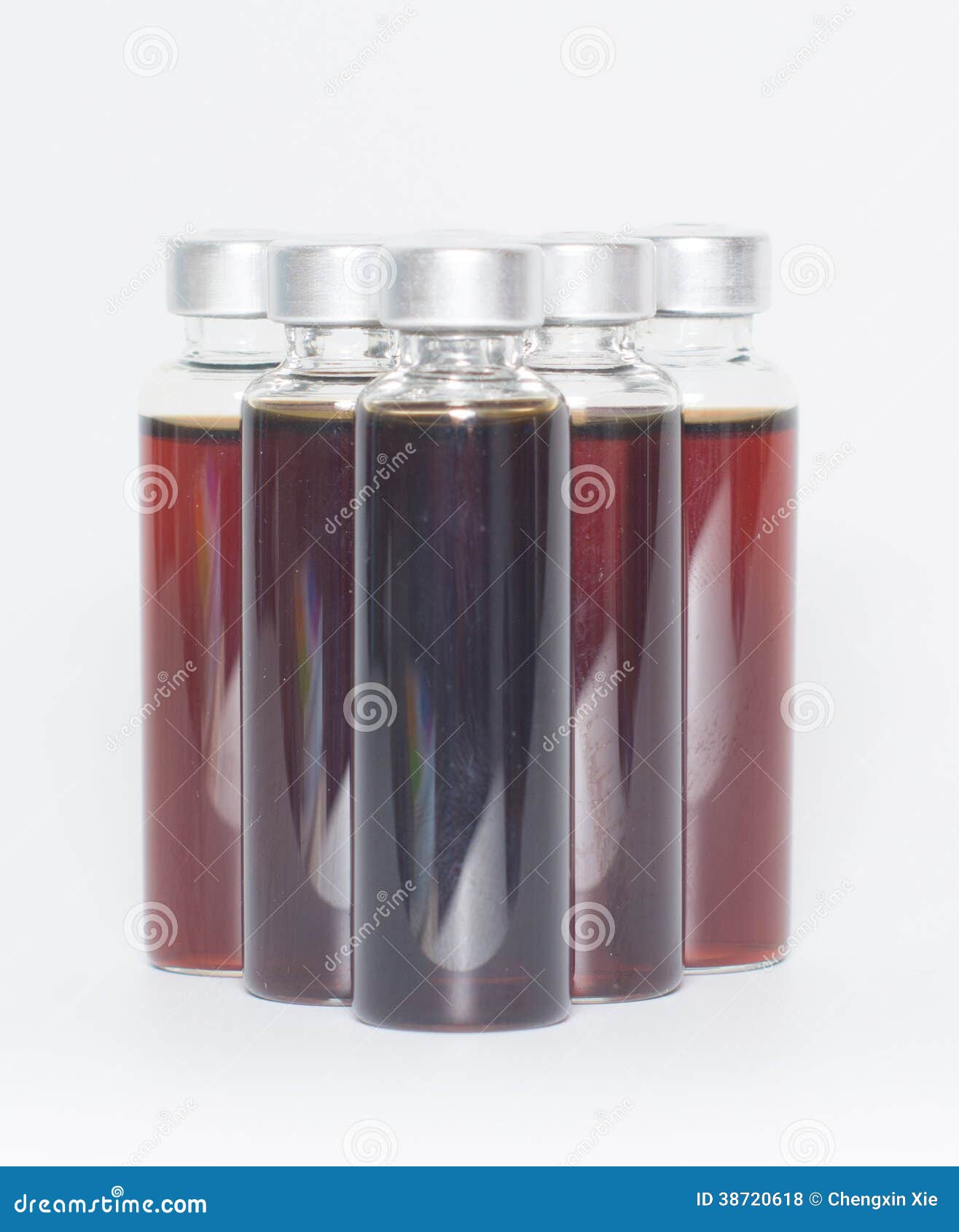 Several Bottles of Liquid Medicine Stock Photo - Image of brown, bottle ...