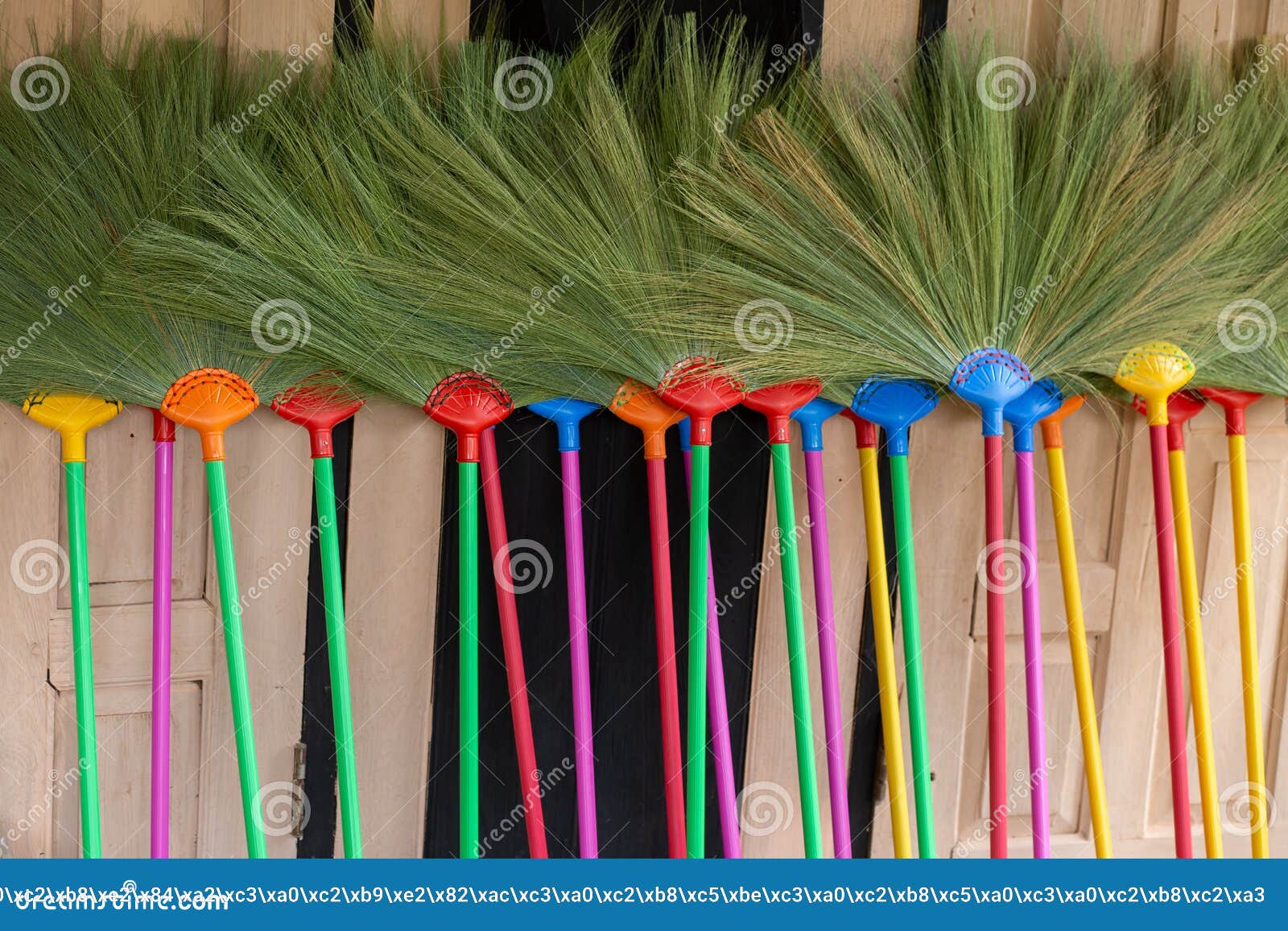 Several brooms Grass broom stock photo. Image of background - 241241430
