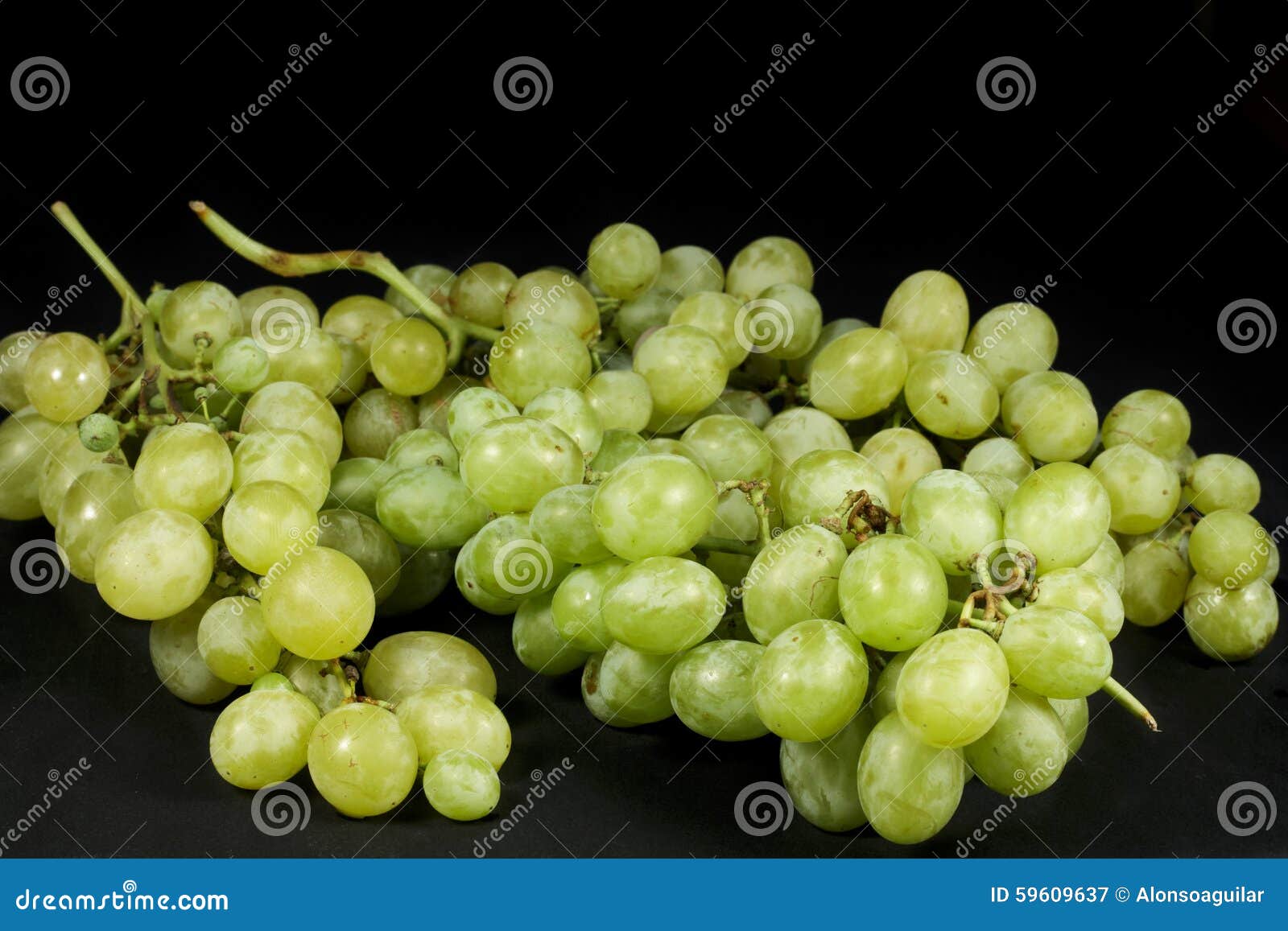 Several Bunches of Table Grapes Isolated on Black Background Stock ...