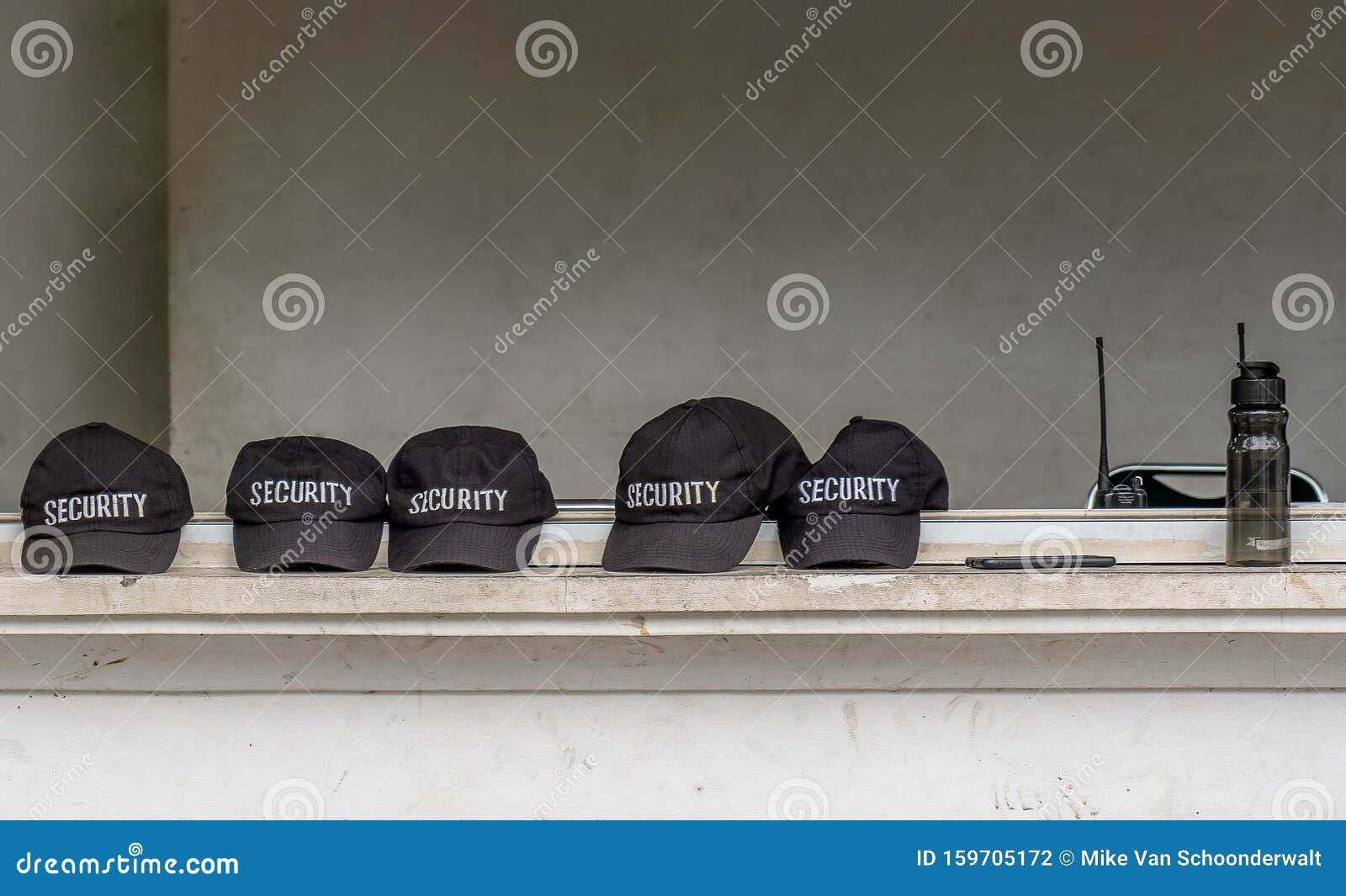 Security caps in a row stock photo. Image of guardian - 159705172