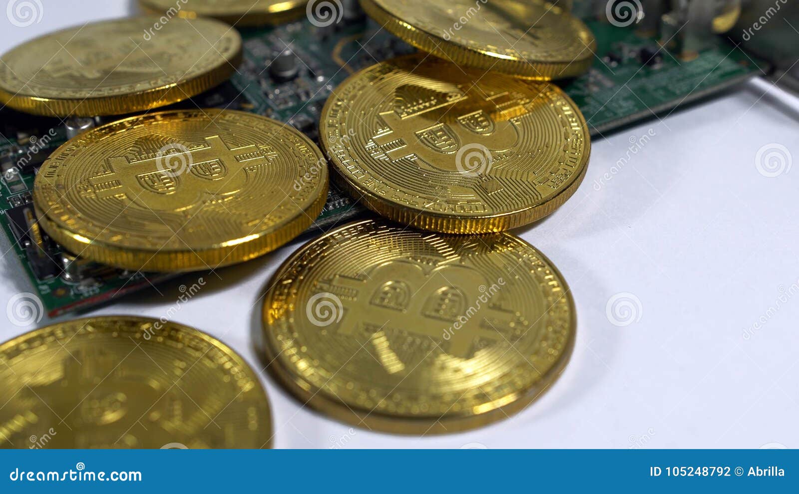 Several Coins of Bitcoins and a Strip of Electronic Memory on a Light ...
