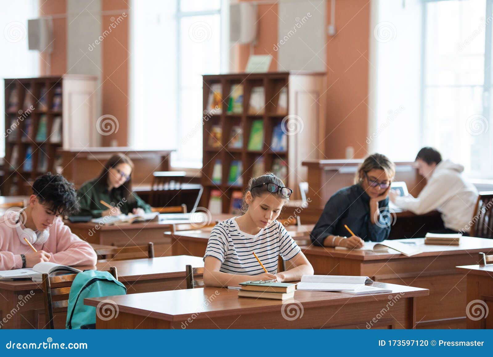 Several College Students Making Notes while Preparing for Seminar Stock ...