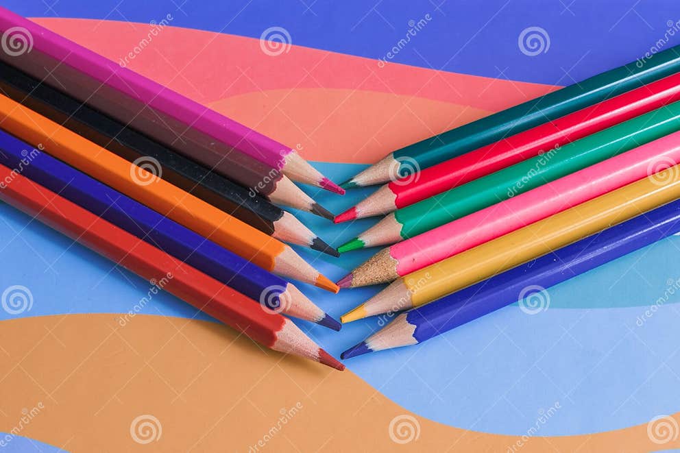 Several Colored Pencils in a Stack on a Background of Shapes Stock ...