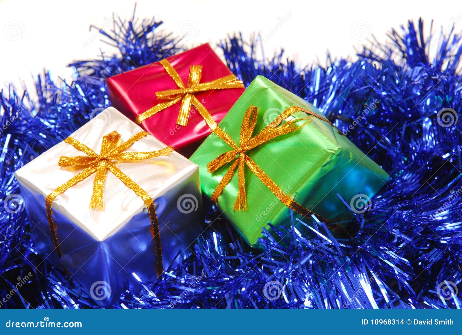 Several Colorful Christmas Presents on Garland Stock Photo - Image of ...