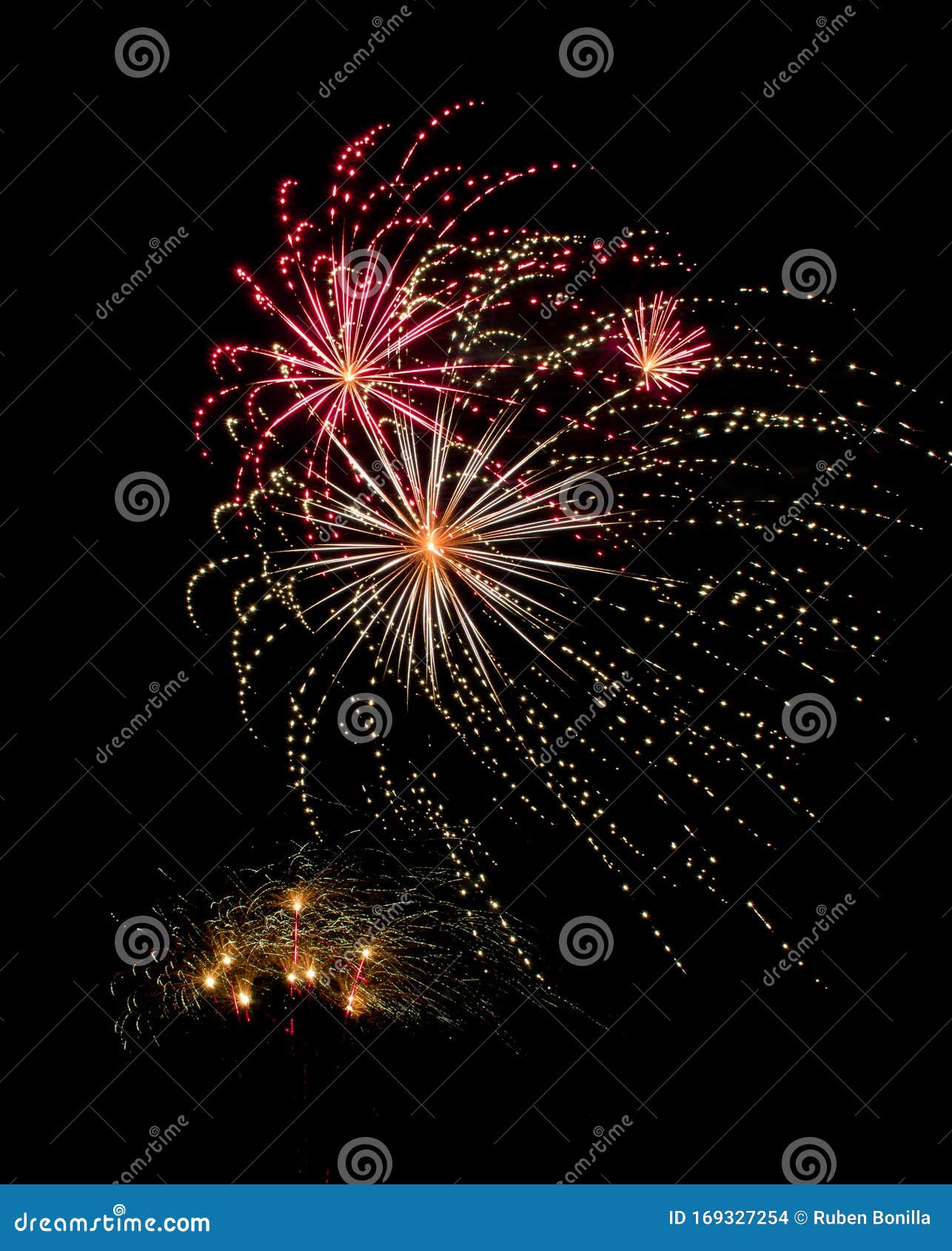 Several Colorful Fireworks Exploding in the Dark Sky in the Middle of ...