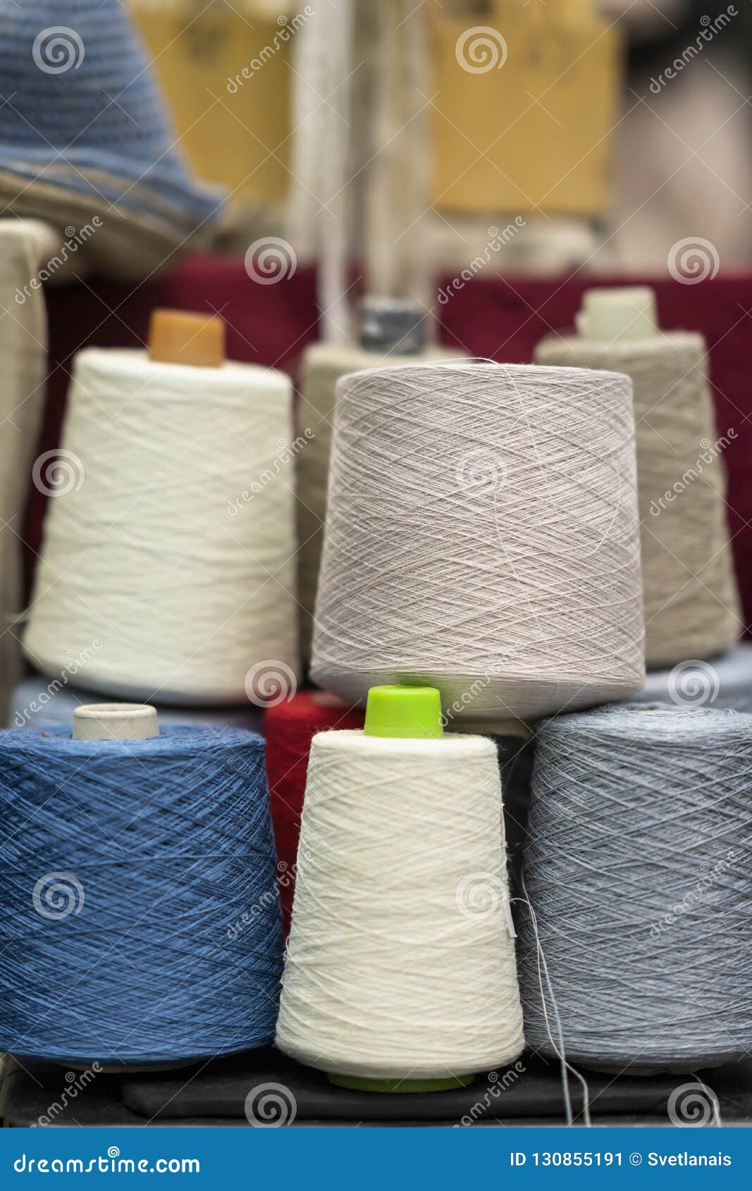 Several Colorful Multicolor Threads in Spools Tape Measure. Textile ...