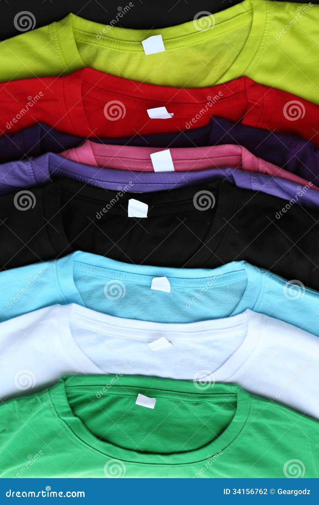 Several colorful t-shirts stock photo. Image of front - 34156762