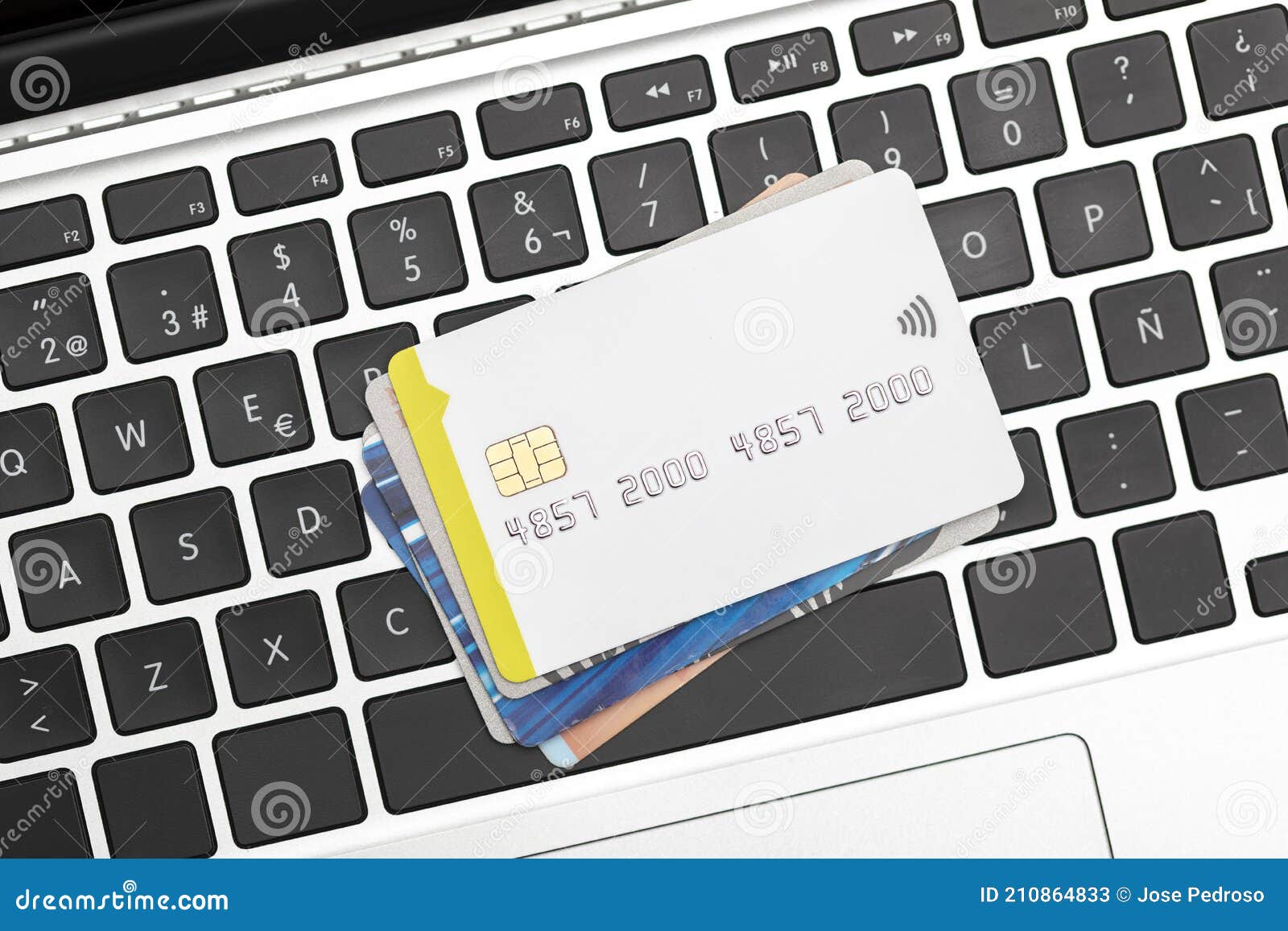 Several Credit Cards on Computer Keyboard with Copy Space. Online ...