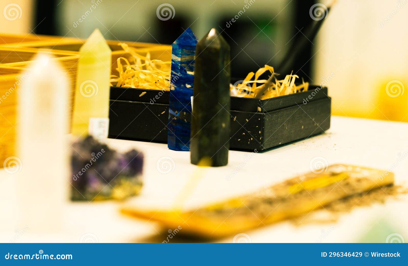 Crystal Stones Displayed on a Table in Front of a Box Stock Image ...