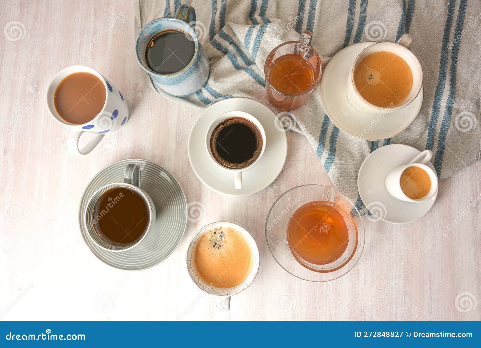 Several Different Cups and Mugs with Coffee and Tea Drinks on a Light ...
