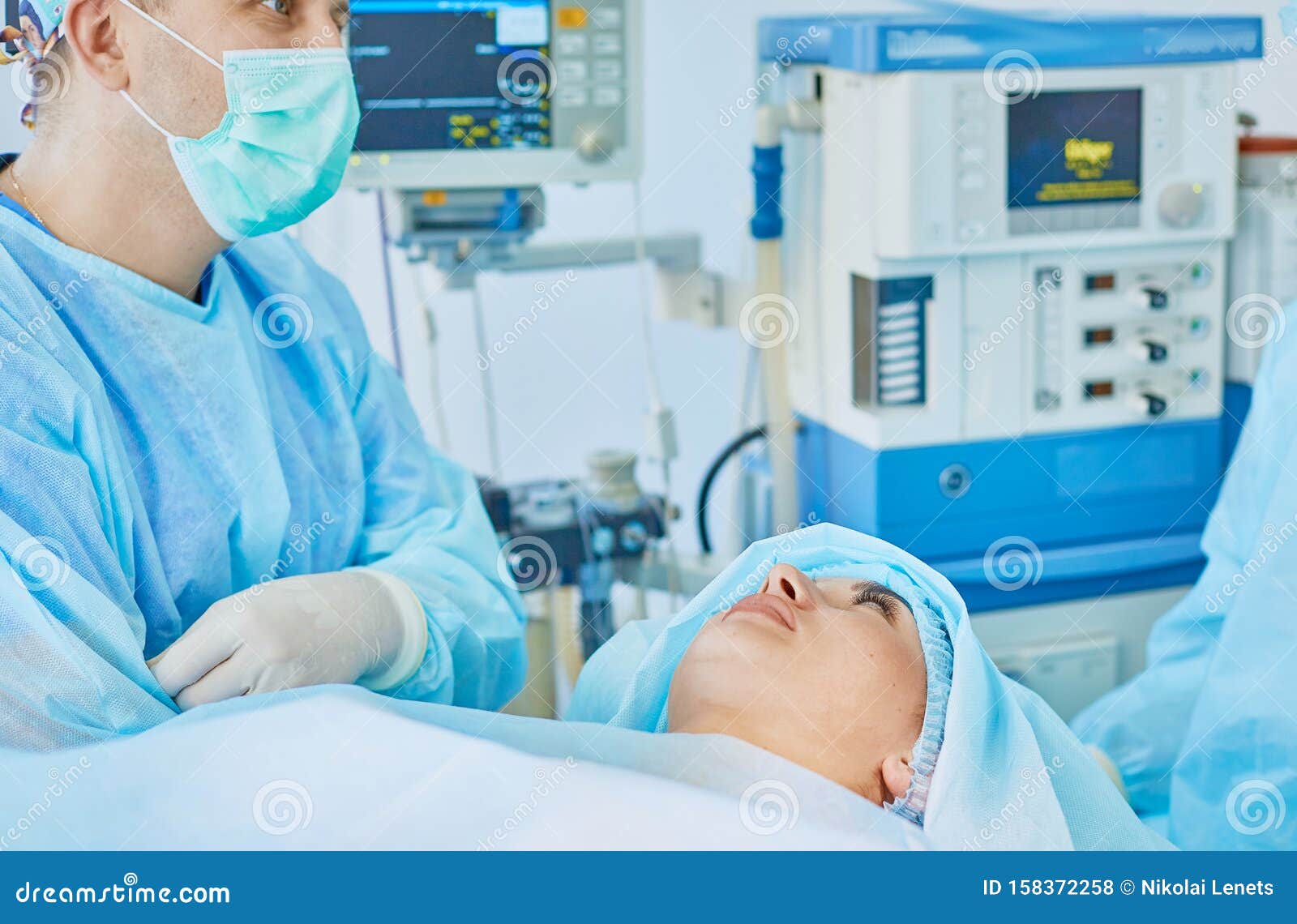 Several Doctors Surrounding Patient on Operation Table during T Stock ...