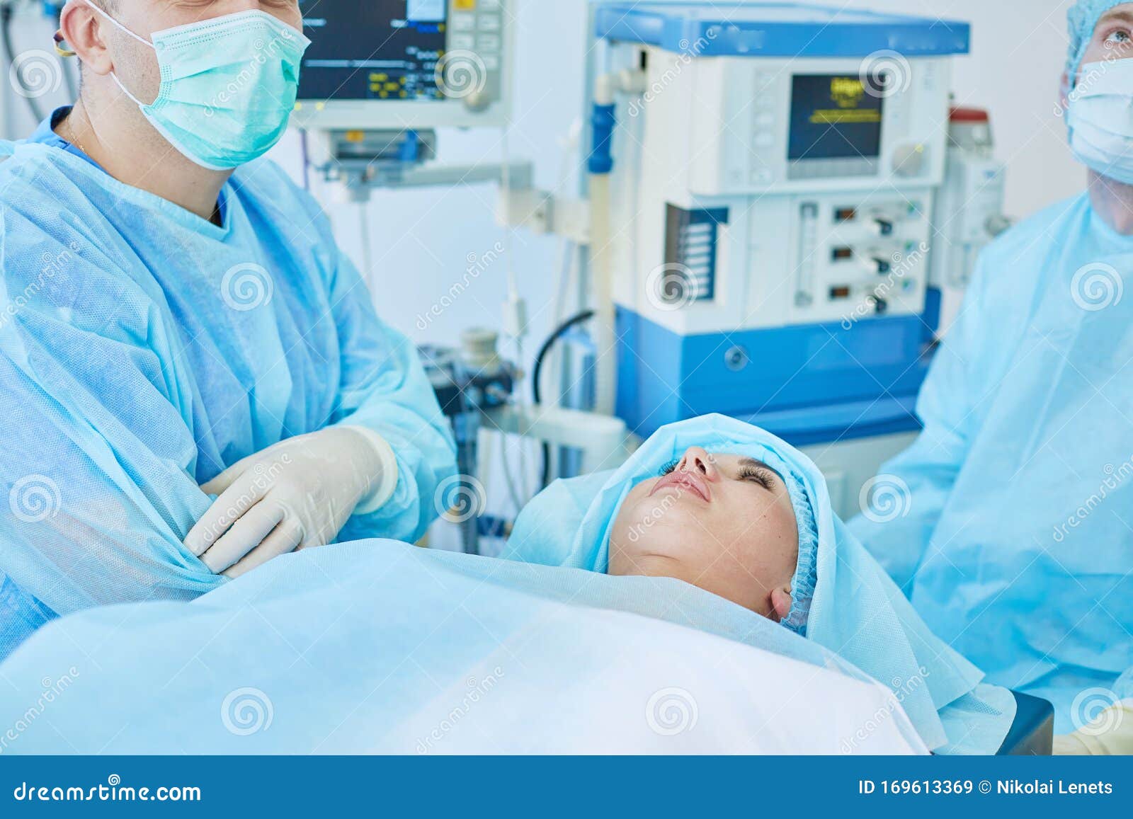 Several Doctors Surrounding Patient on Operation Table during Their ...