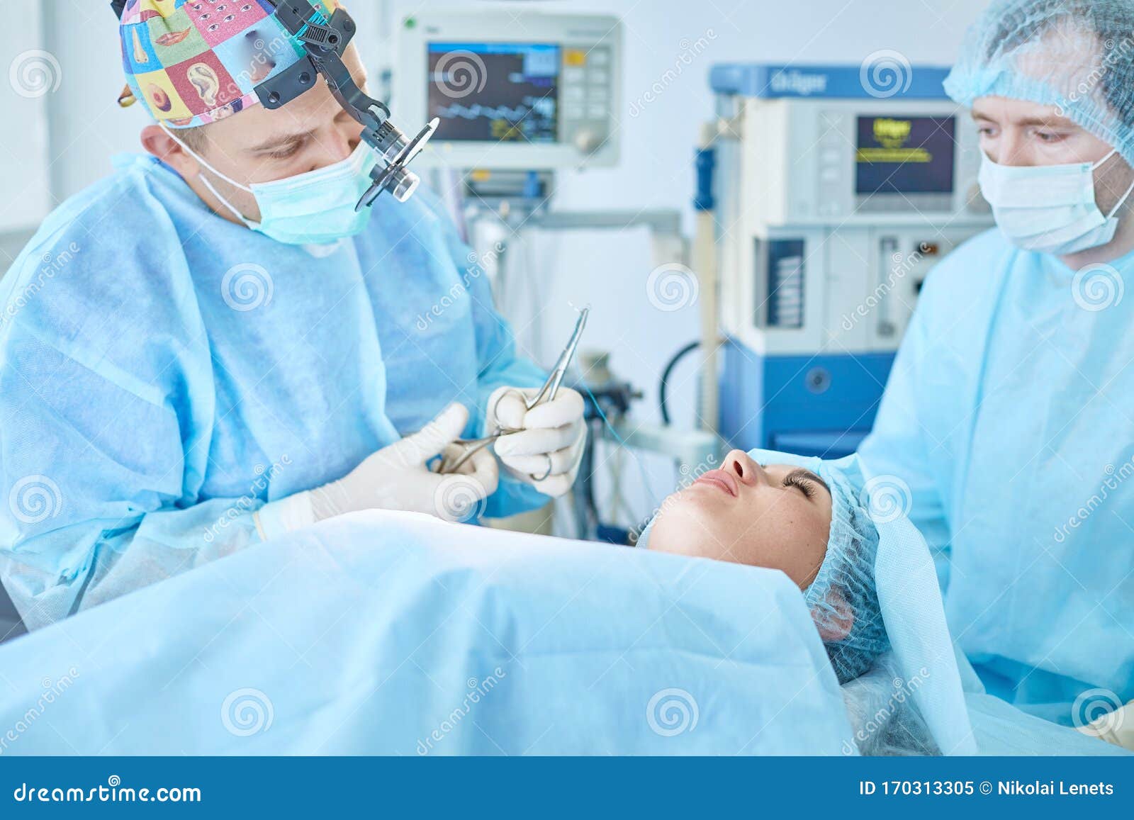 Several Doctors Surrounding Patient on Operation Table during Their ...