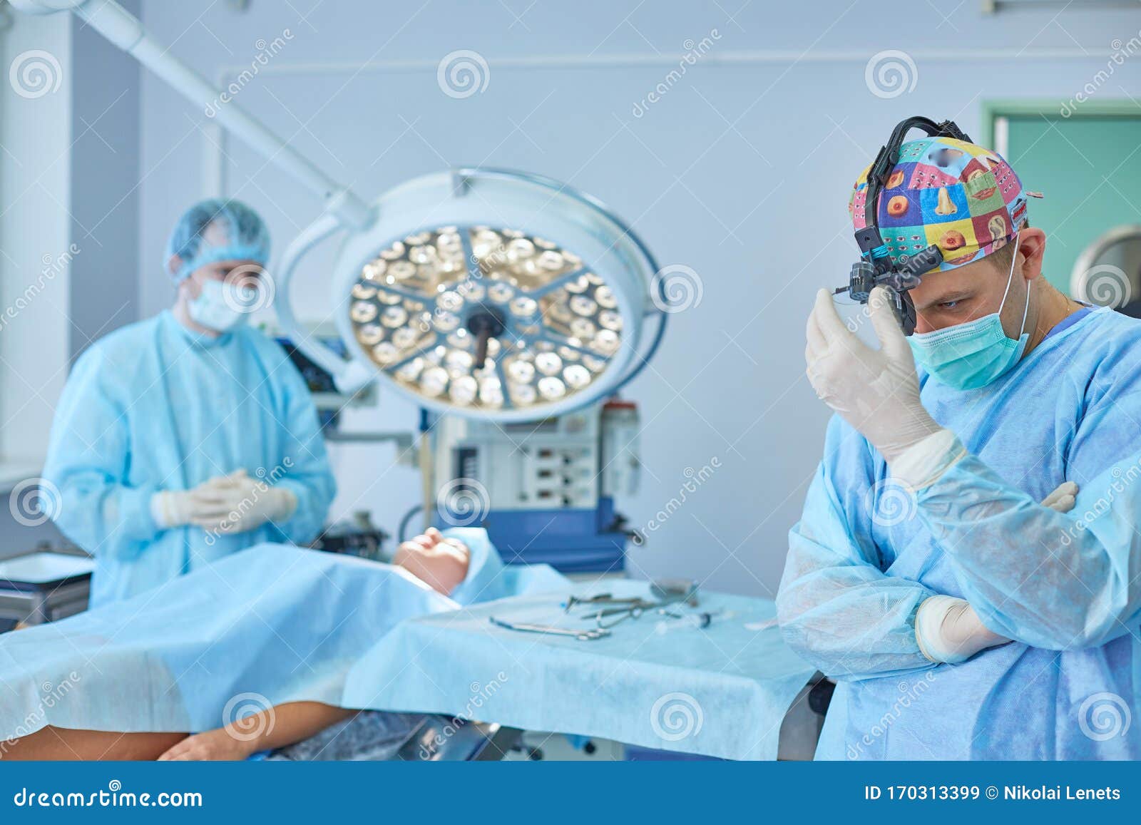 Several Doctors Surrounding Patient on Operation Table during Their ...