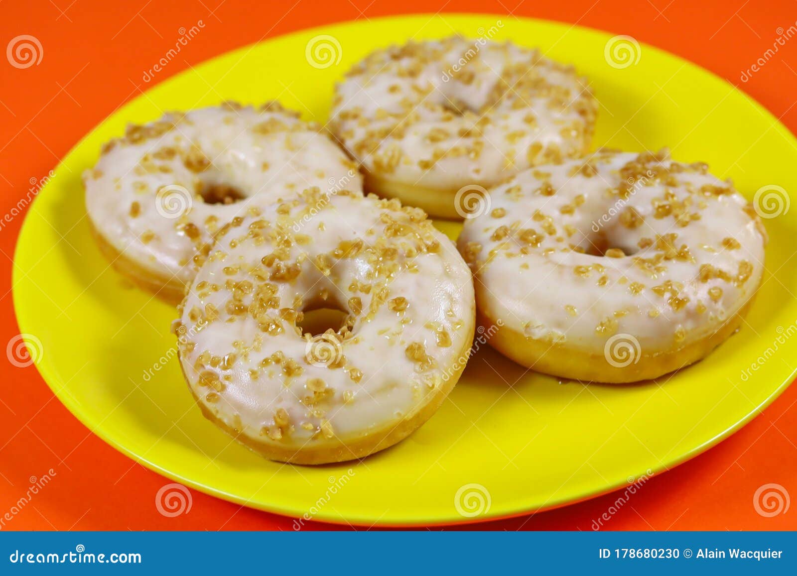 Donuts on a plate stock photo. Image of united, donuts - 178680230