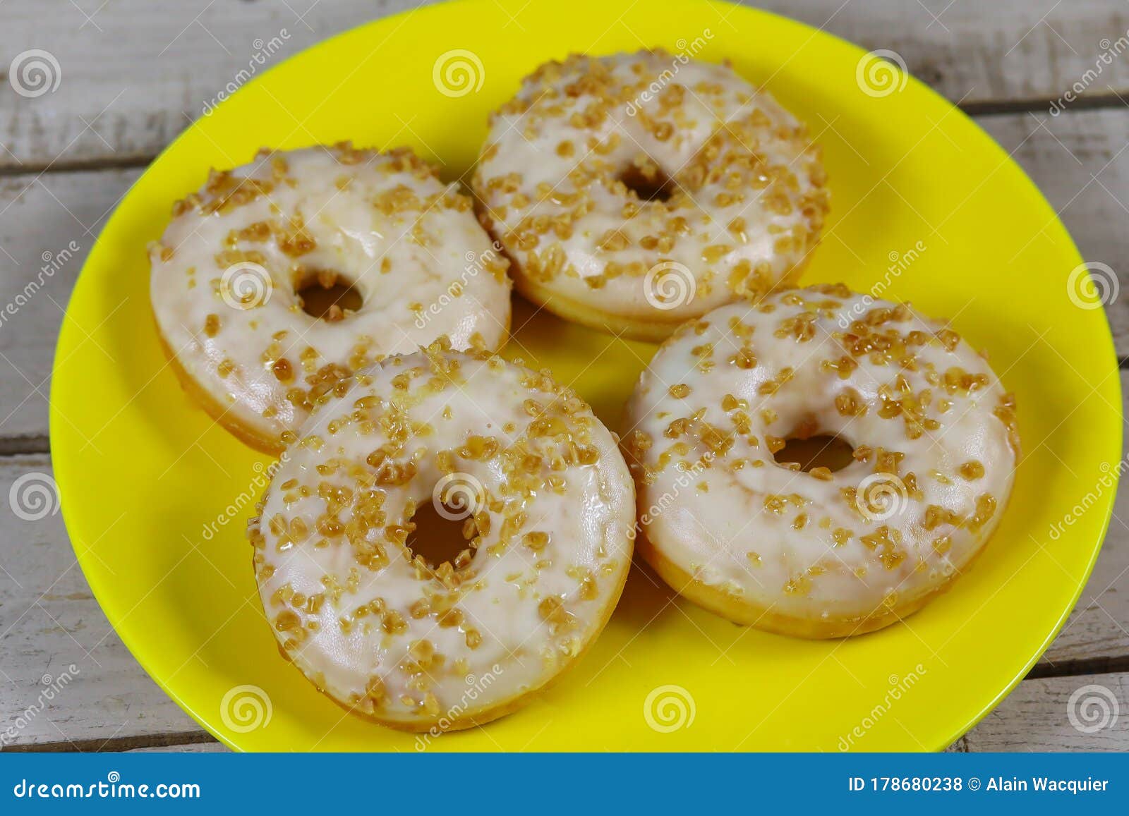 Donuts on a plate stock photo. Image of sugar, frosting - 178680238